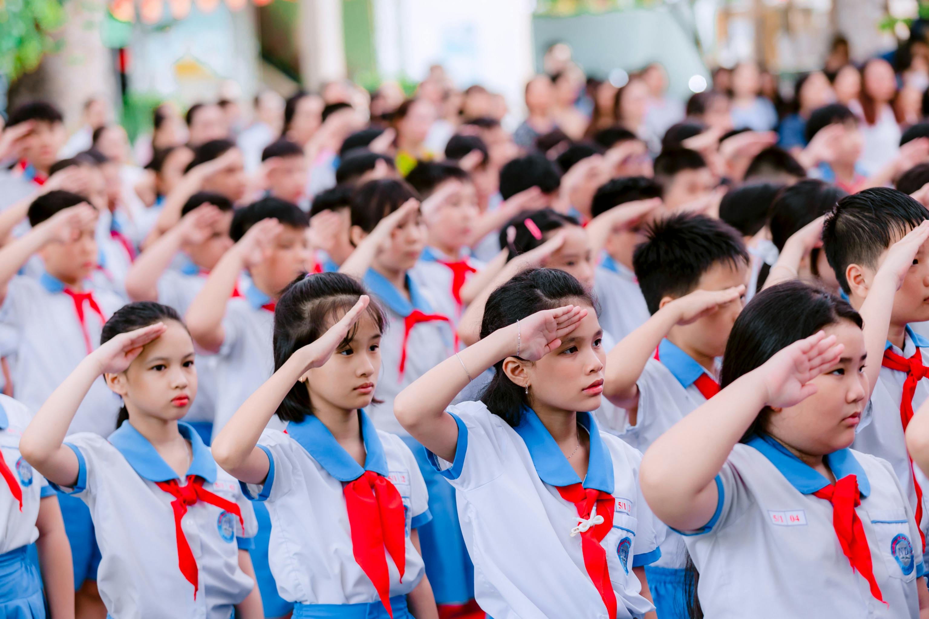 School Children Saluting in Uniform Assembly · Free Stock Photo