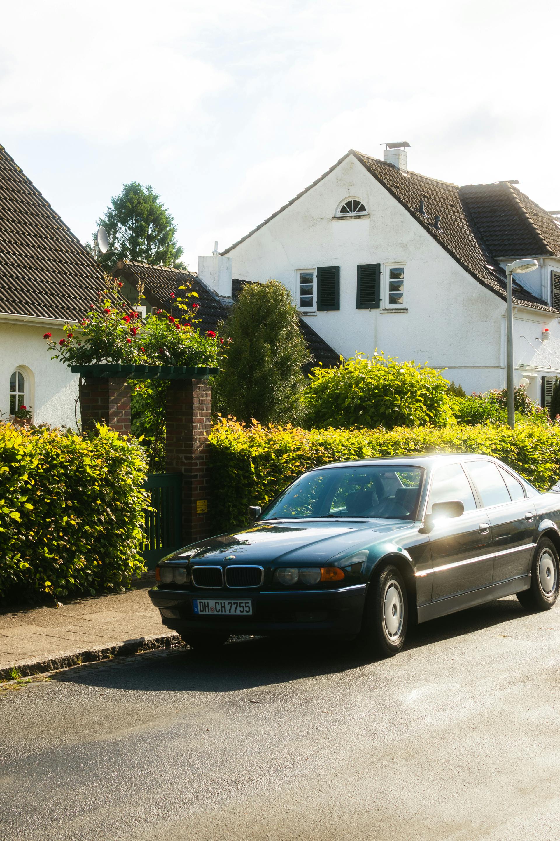 Classic Car by Quaint Suburban Residence · Free Stock Photo