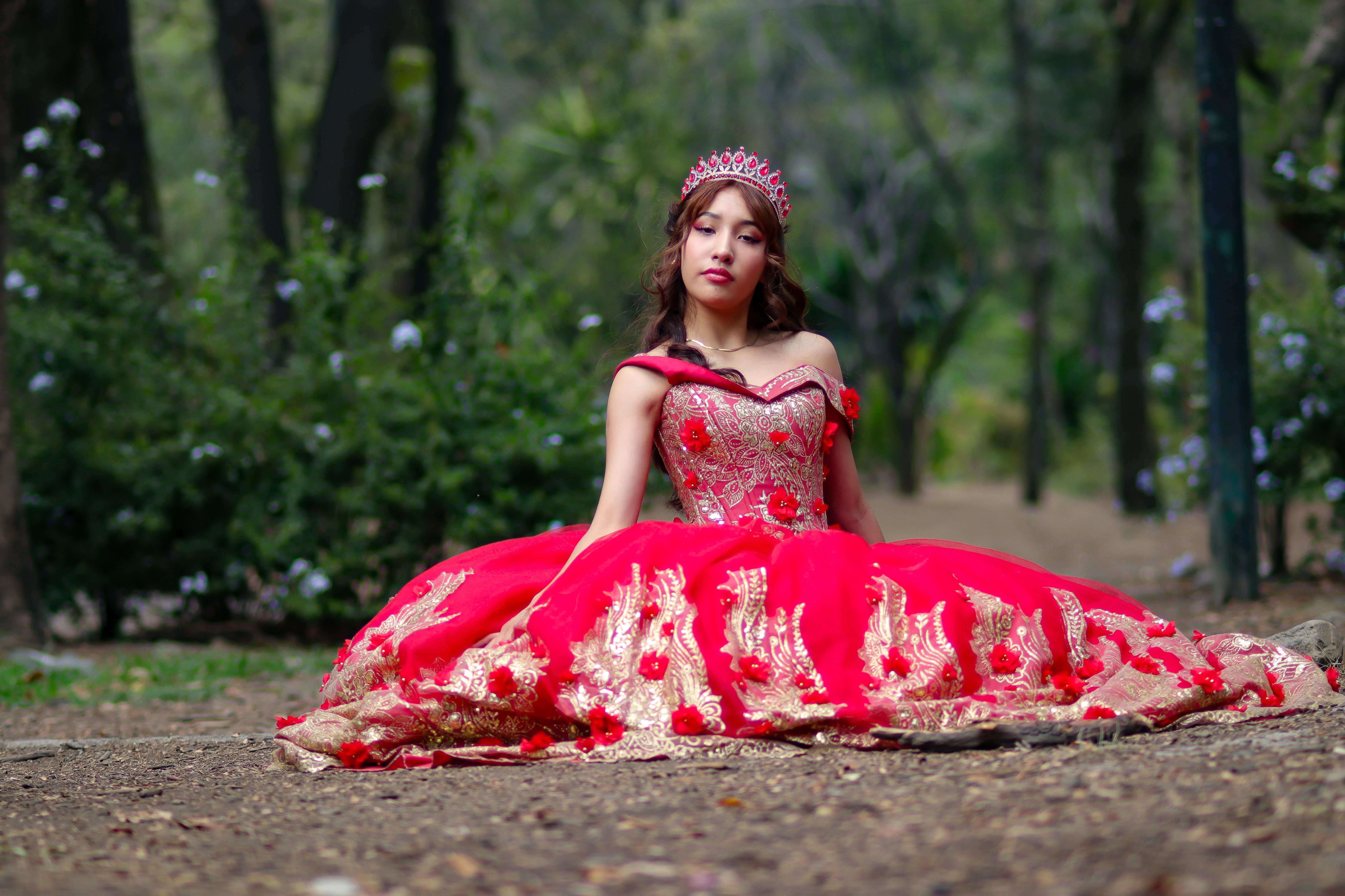 Elegant Quinceañera Portrait in Vibrant Red Dress · Free Stock Photo