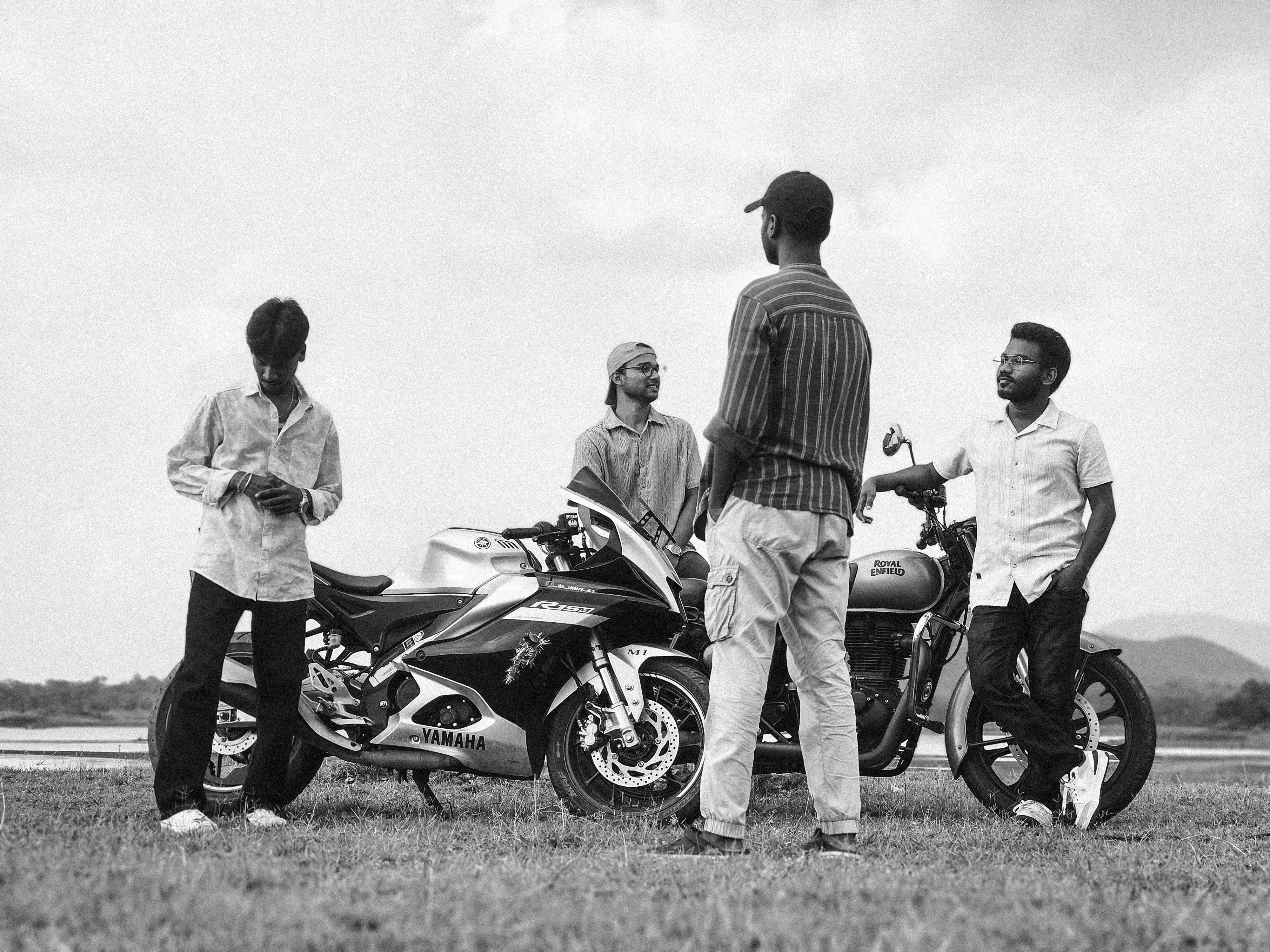 Young Men Enjoying Motorcycle Meet Outdoors · Free Stock Photo