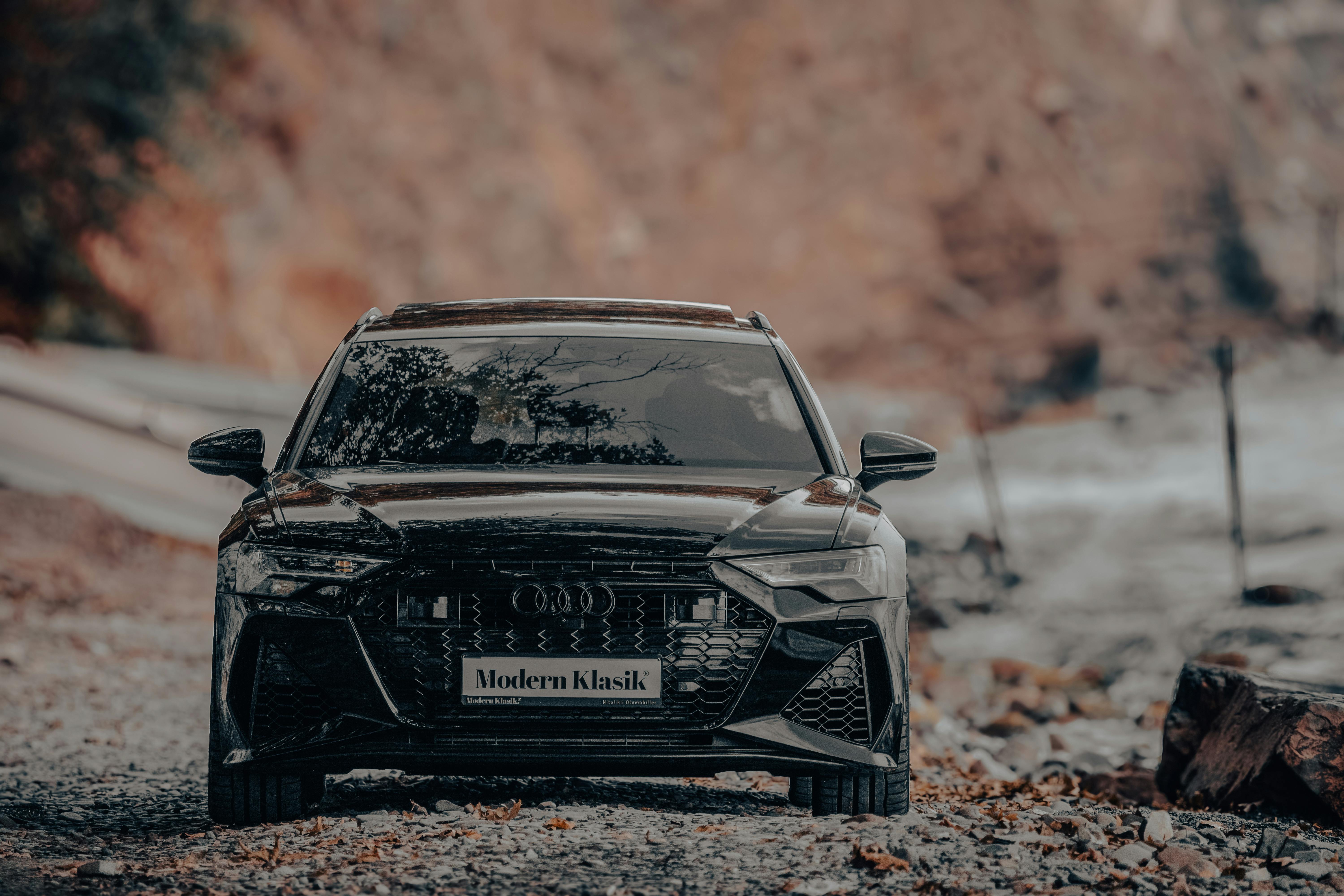 Black Luxury Car Front View Outdoors · Free Stock Photo