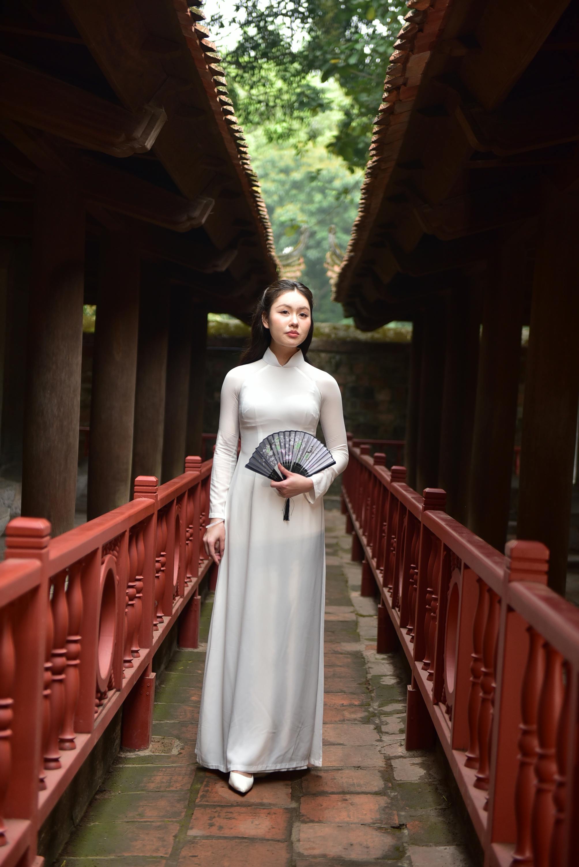 Young Woman in Traditional Dress at Historic Temple · Free Stock Photo