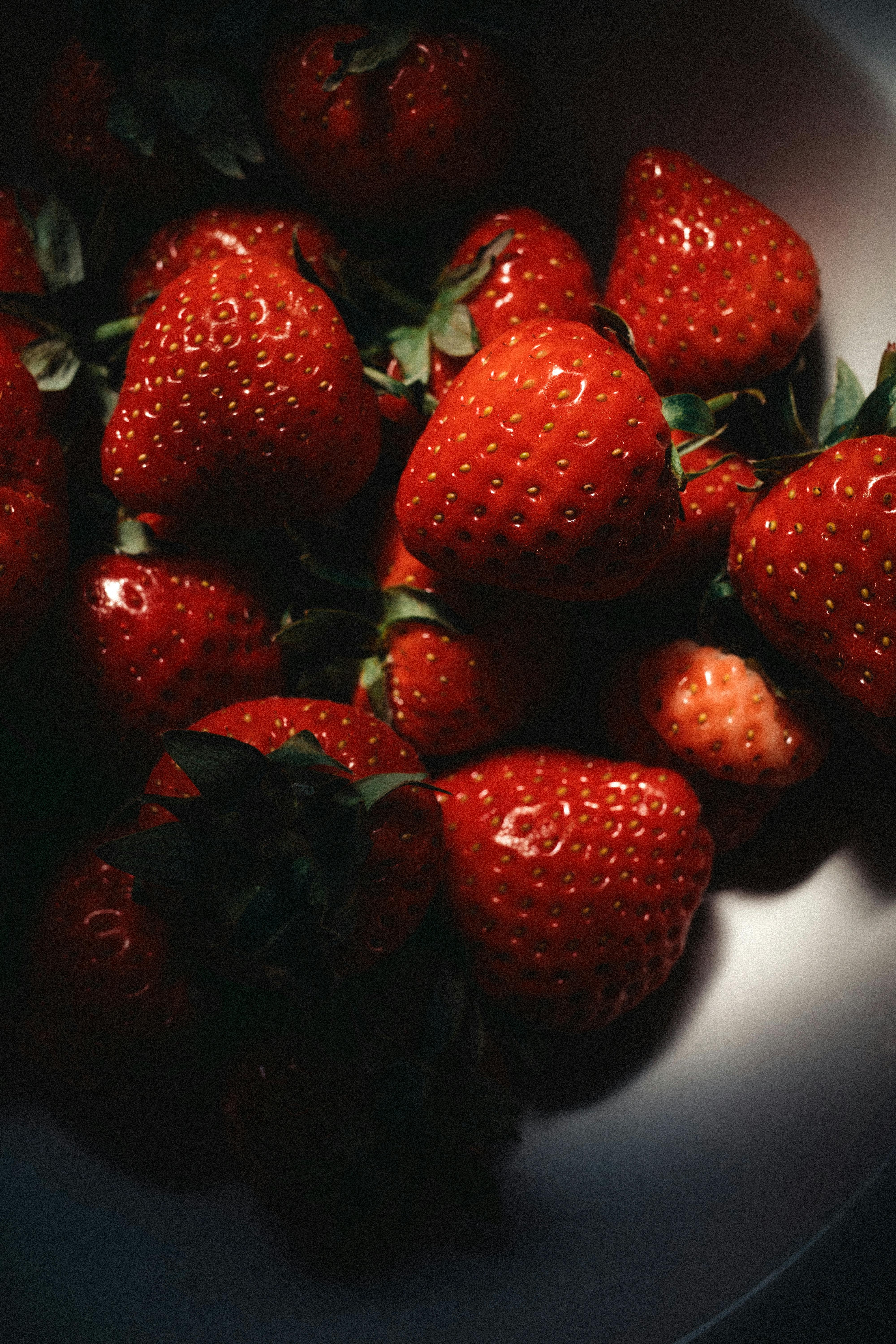 Fresh Strawberries with Dramatic Lighting · Free Stock Photo