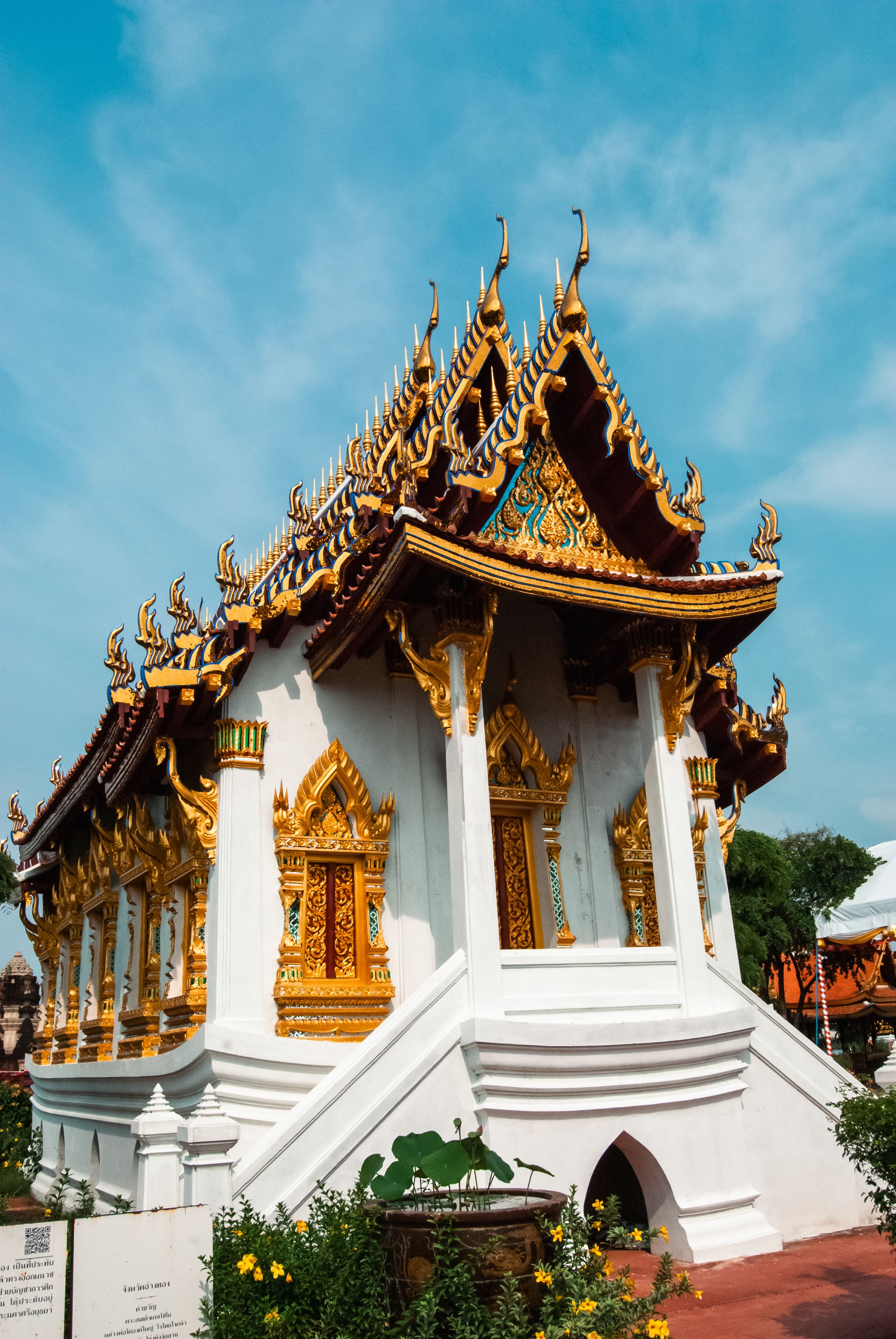 Intricate Thai Temple Under Clear Blue Sky · Free Stock Photo