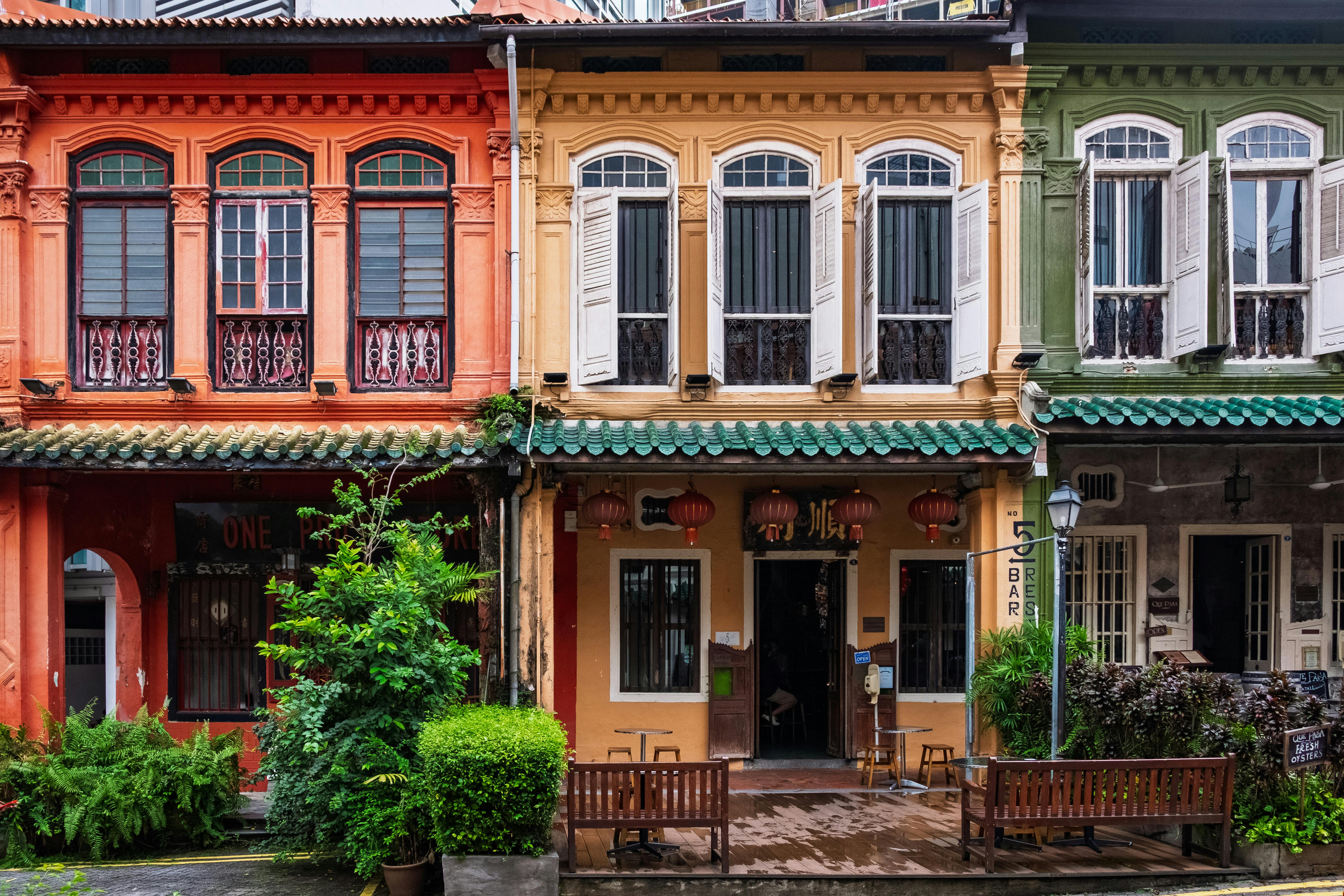 Charming Colonial Shophouses in Vibrant Colors · Free Stock Photo
