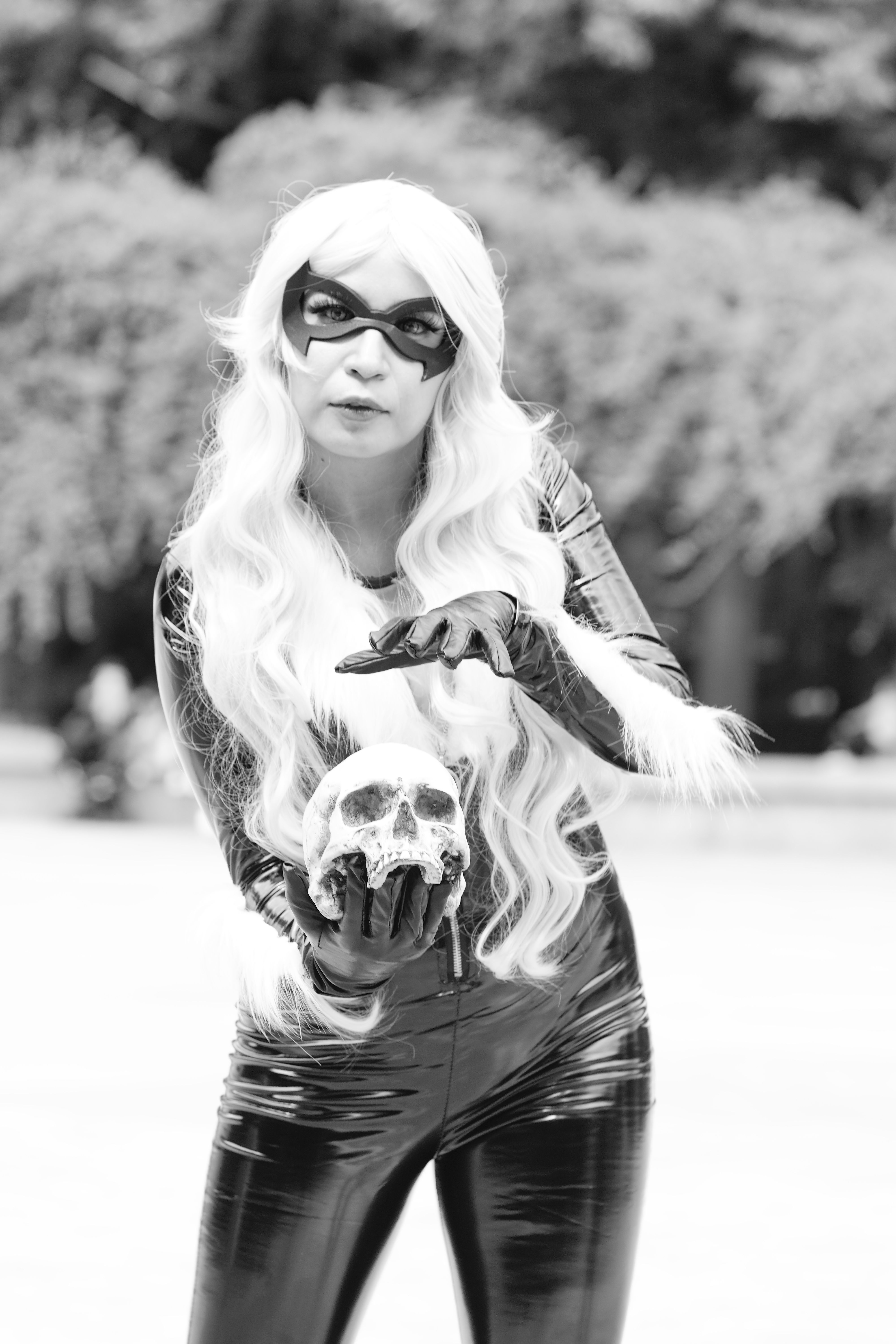 Cosplayer in Black and White Costume with Skull · Free Stock Photo