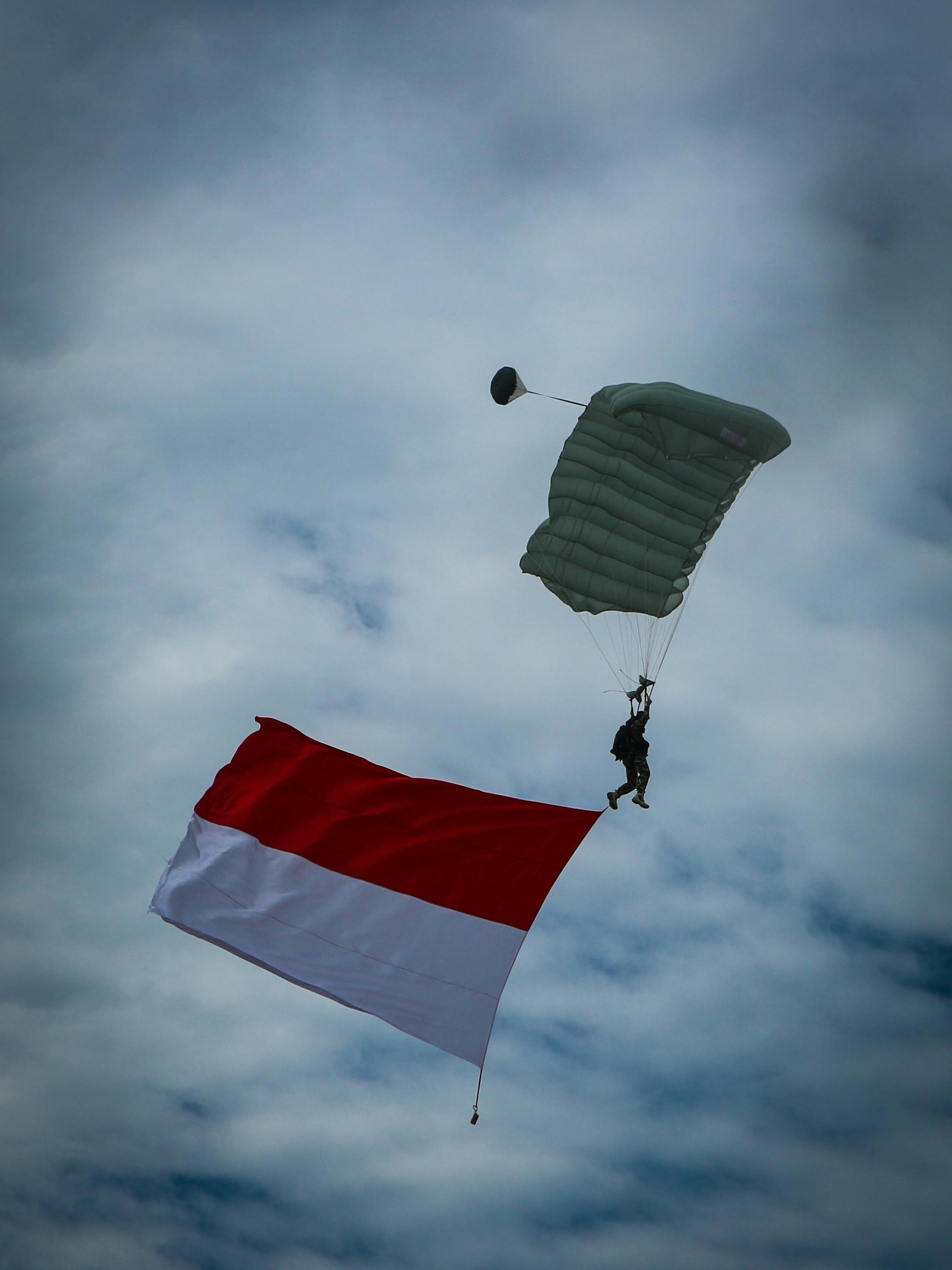 Indonesian Paratrooper with Merah Putih Flag · Free Stock Photo