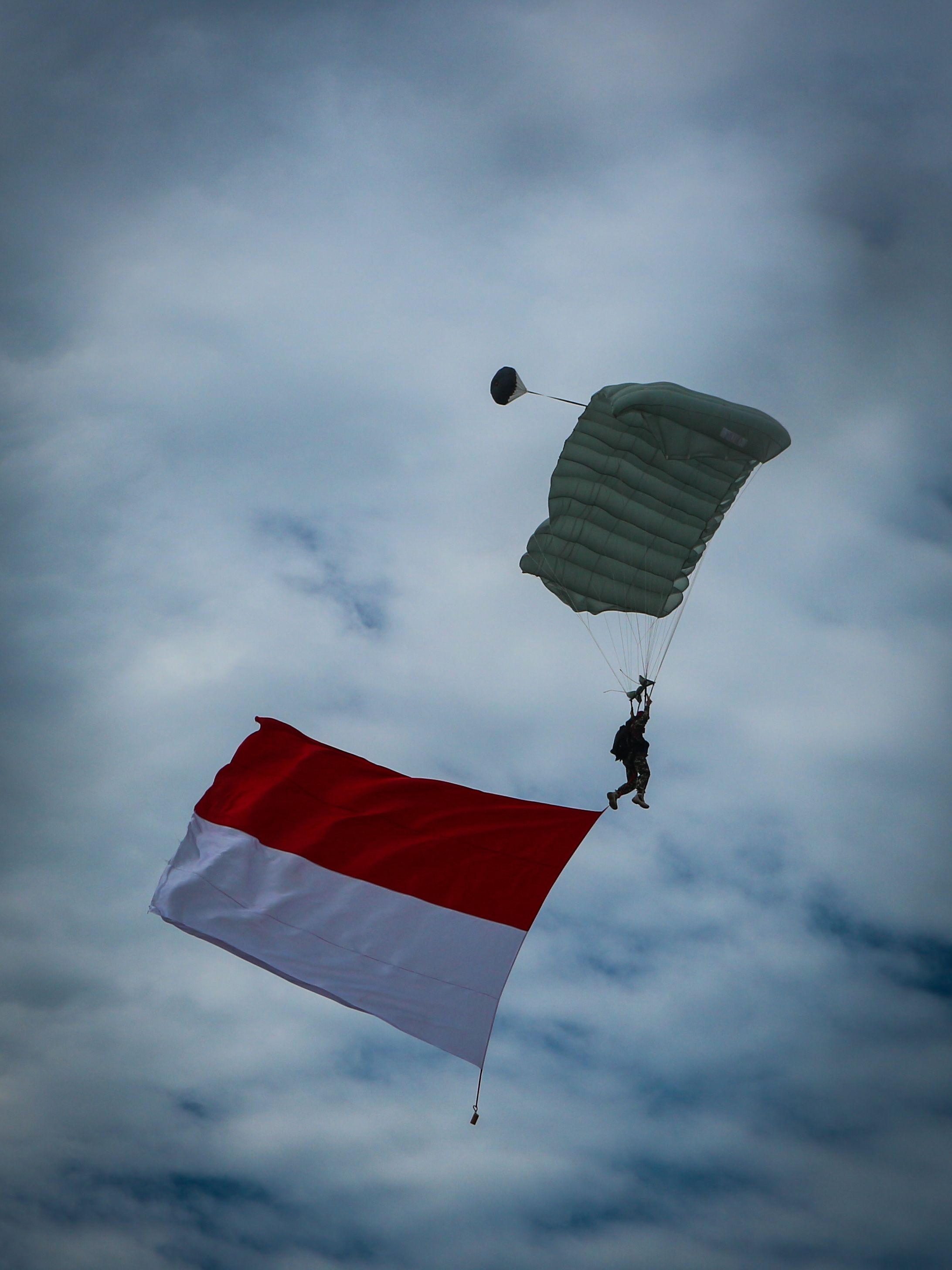Indonesian Paratrooper with Merah Putih Flag · Free Stock Photo