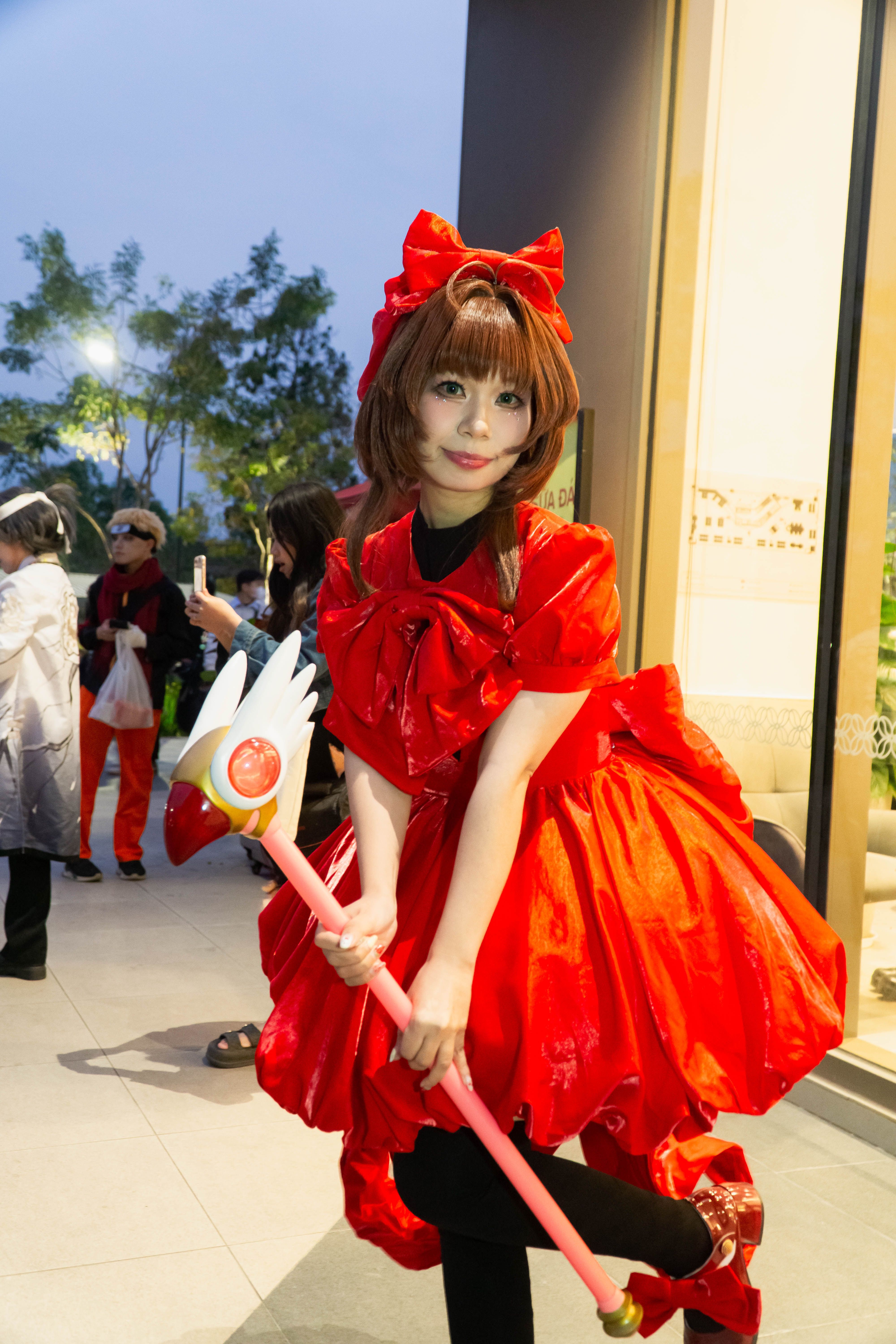 Cosplayer in Vibrant Red Costume at Event · Free Stock Photo