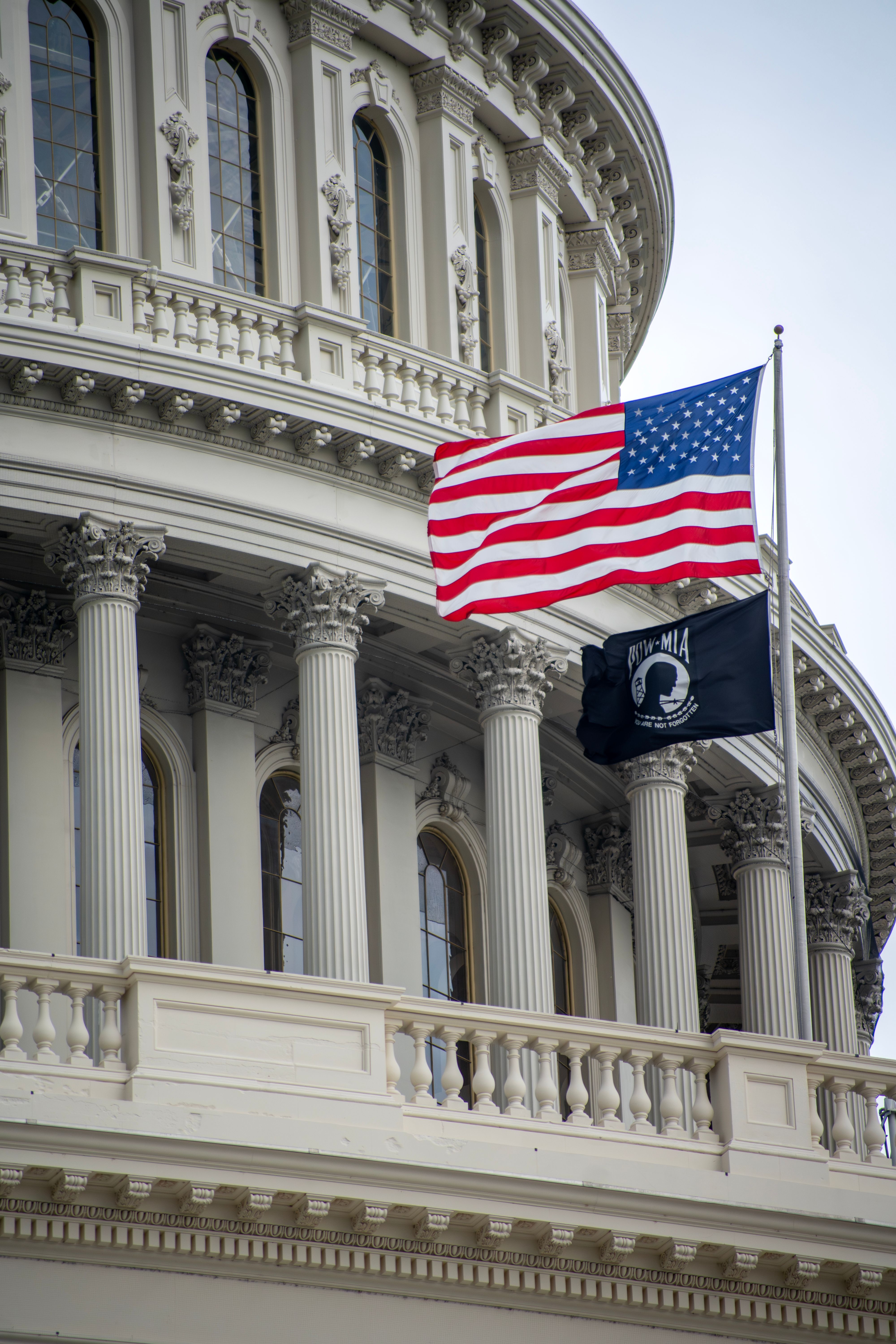 US Capitol Building with American Flag · Free Stock Photo