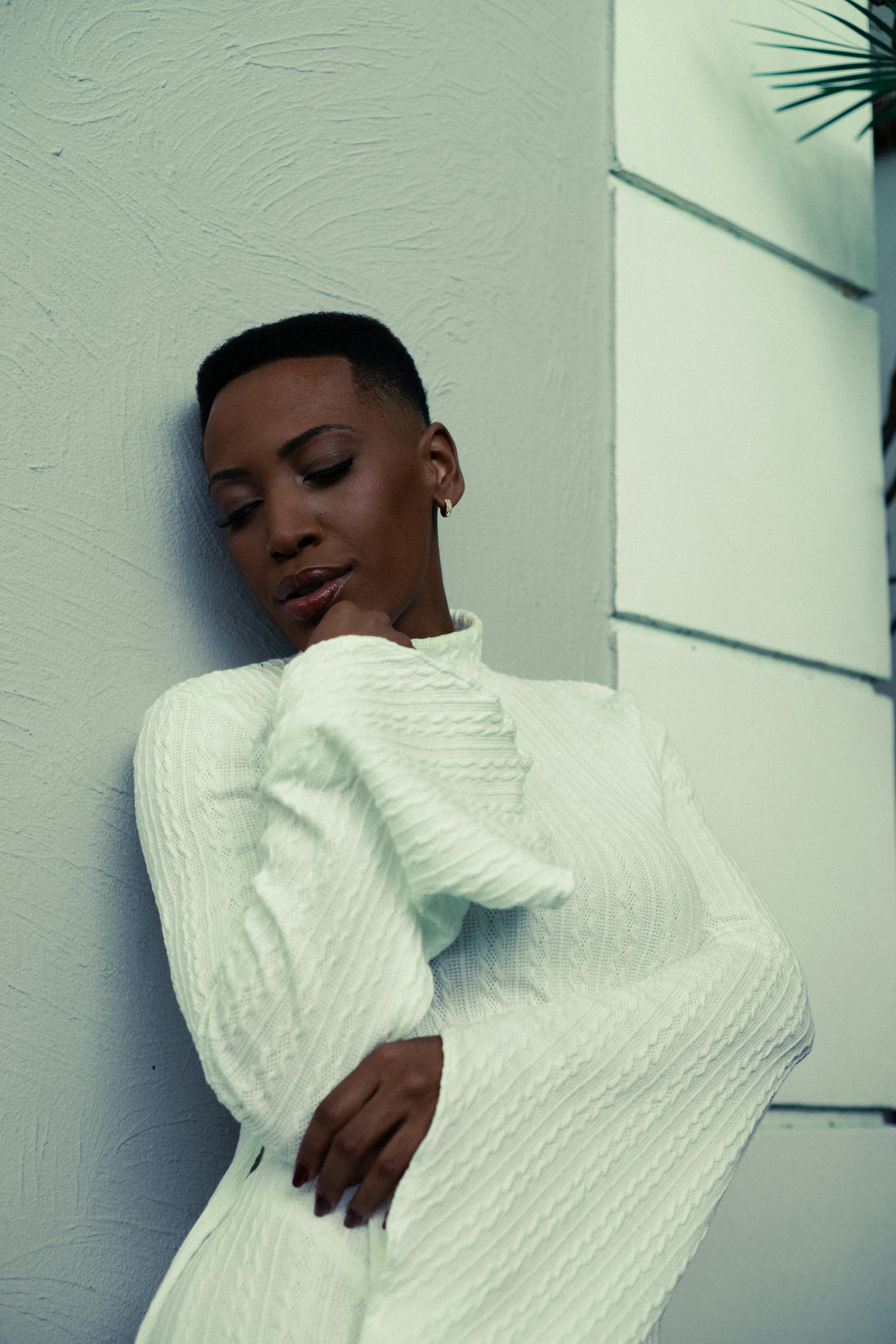 Elegant Portrait of Woman in White Outfit Outdoors · Free Stock Photo