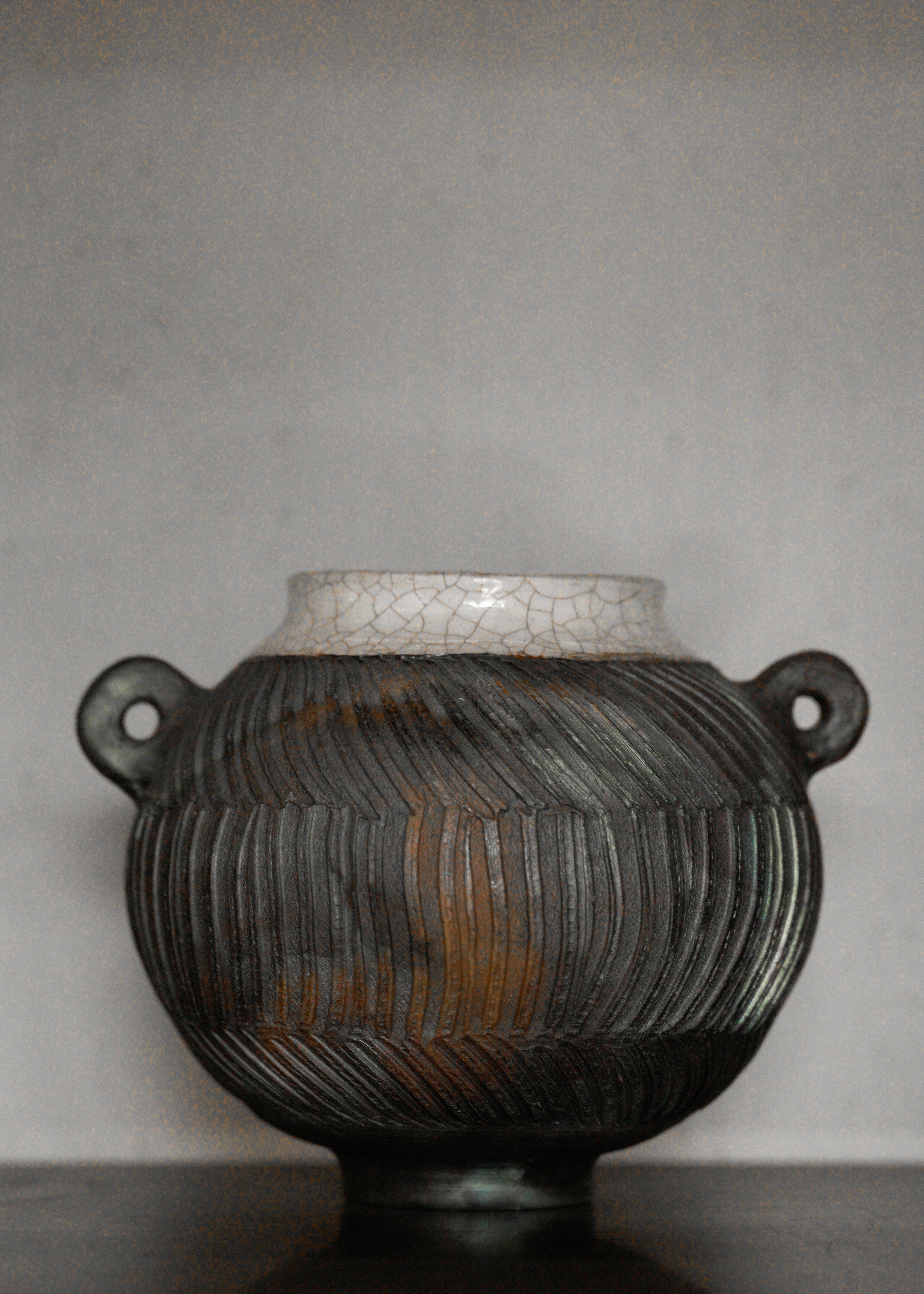 Elegant Ceramic Vase with Textured Design · Free Stock Photo