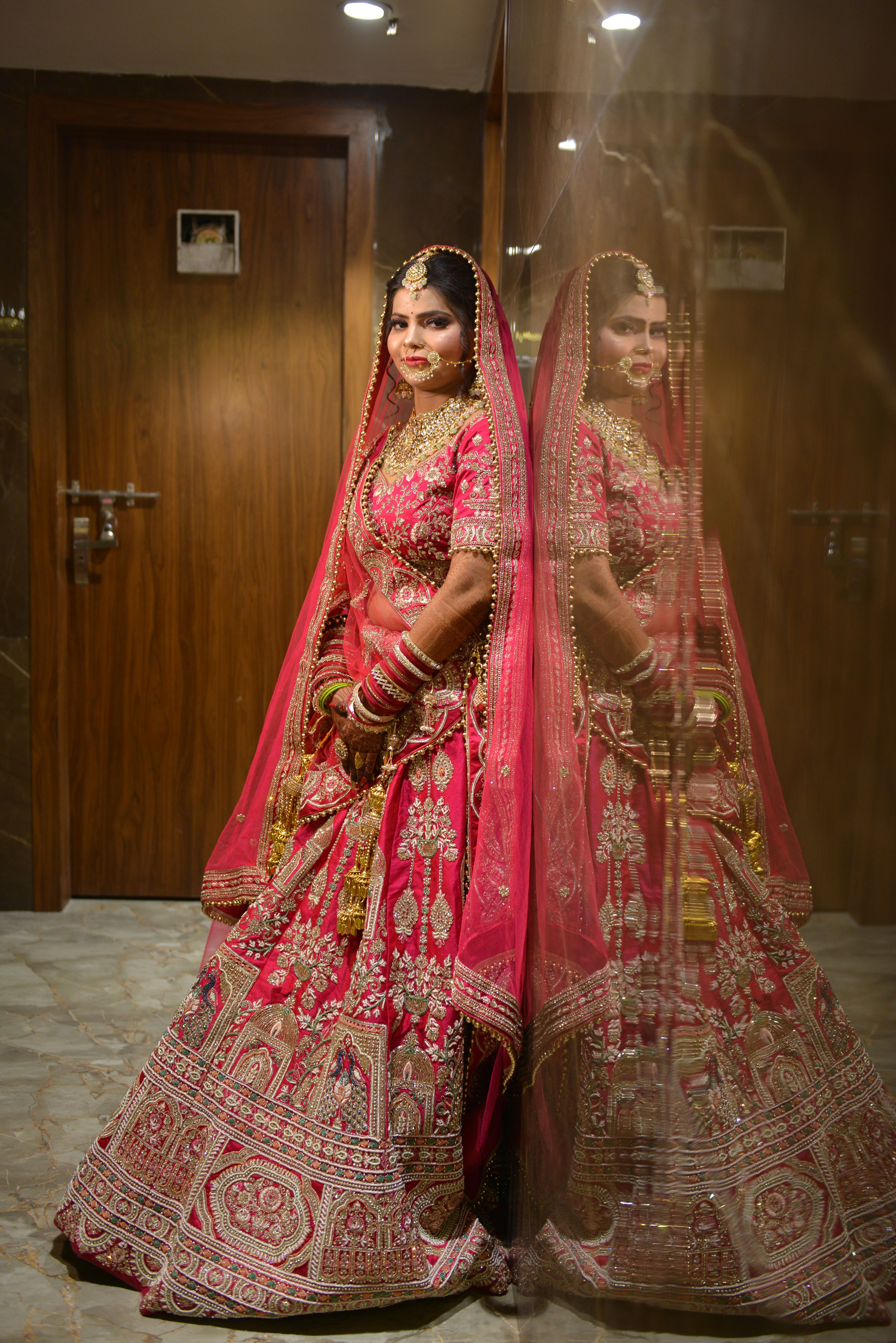 Elegant Indian Bride in Traditional Wedding Attire · Free Stock Photo