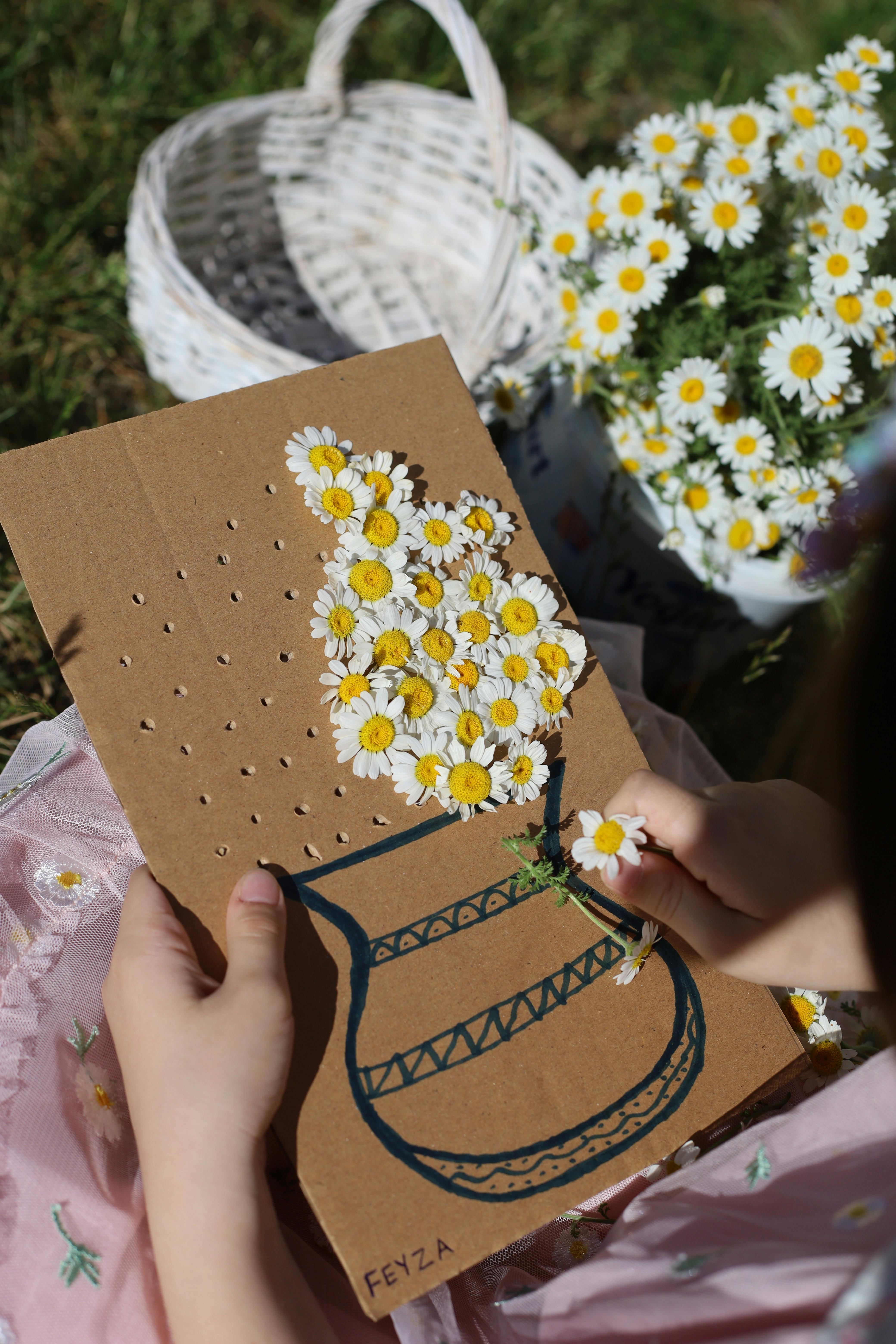 Creative Handmade Daisy Flower Art on Cardboard · Free Stock Photo