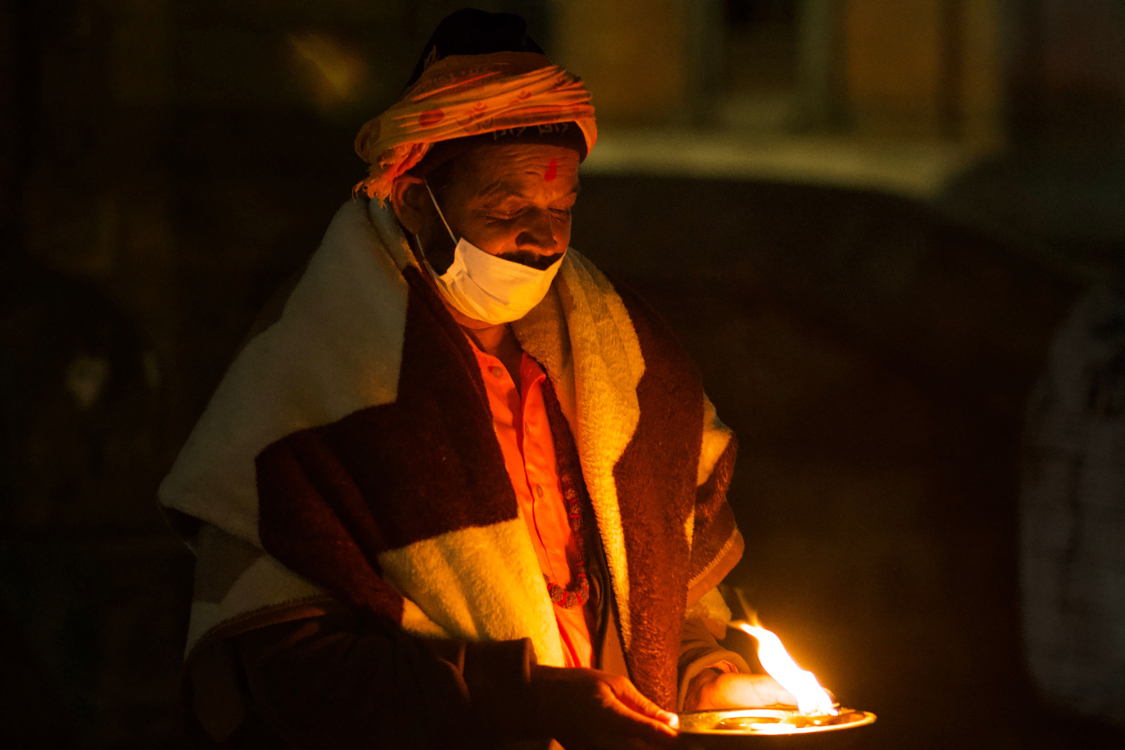 Hindu Priest Performing Ritual with Ghee Lamp · Free Stock Photo