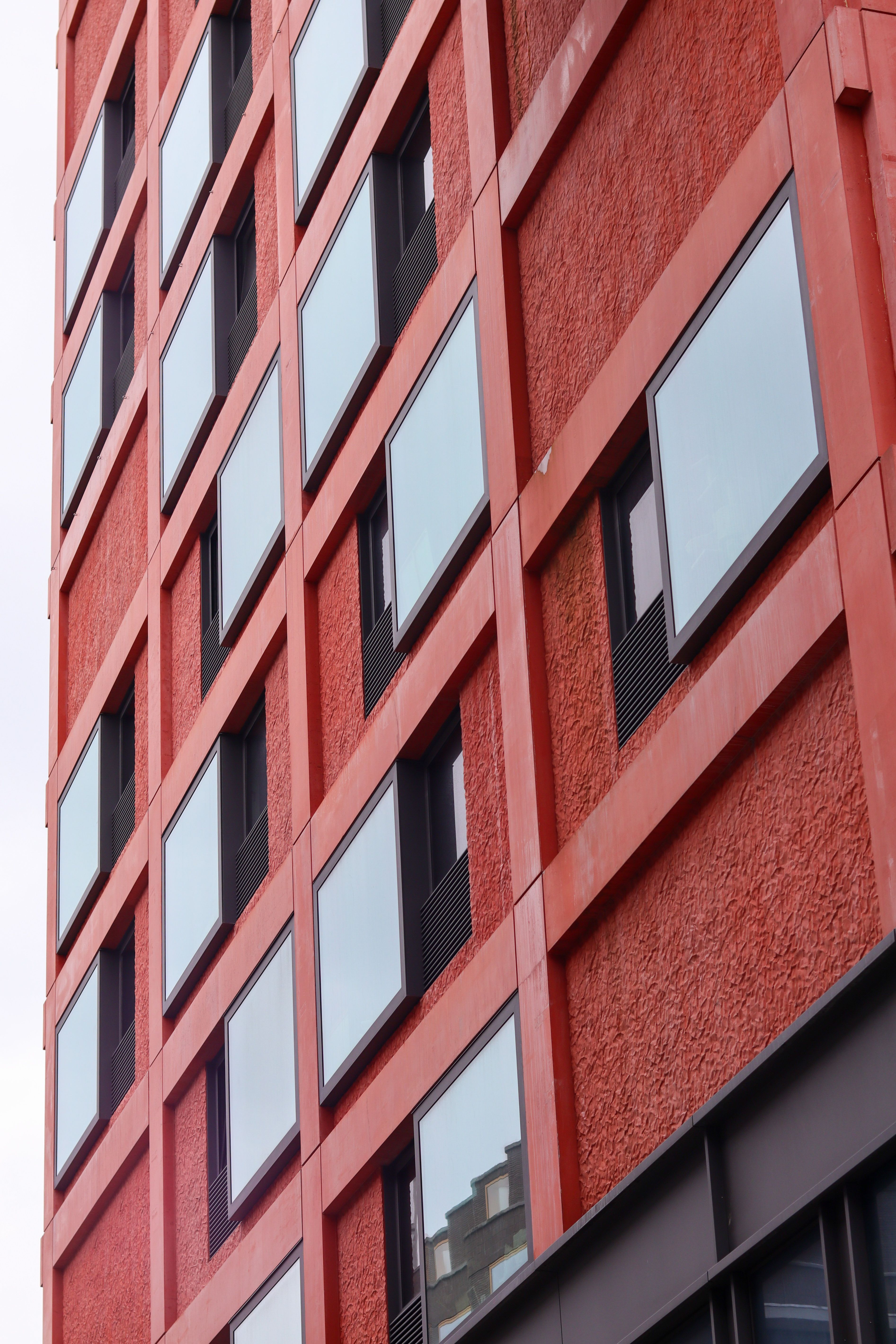 Modern Red Facade of Eindhoven Building · Free Stock Photo