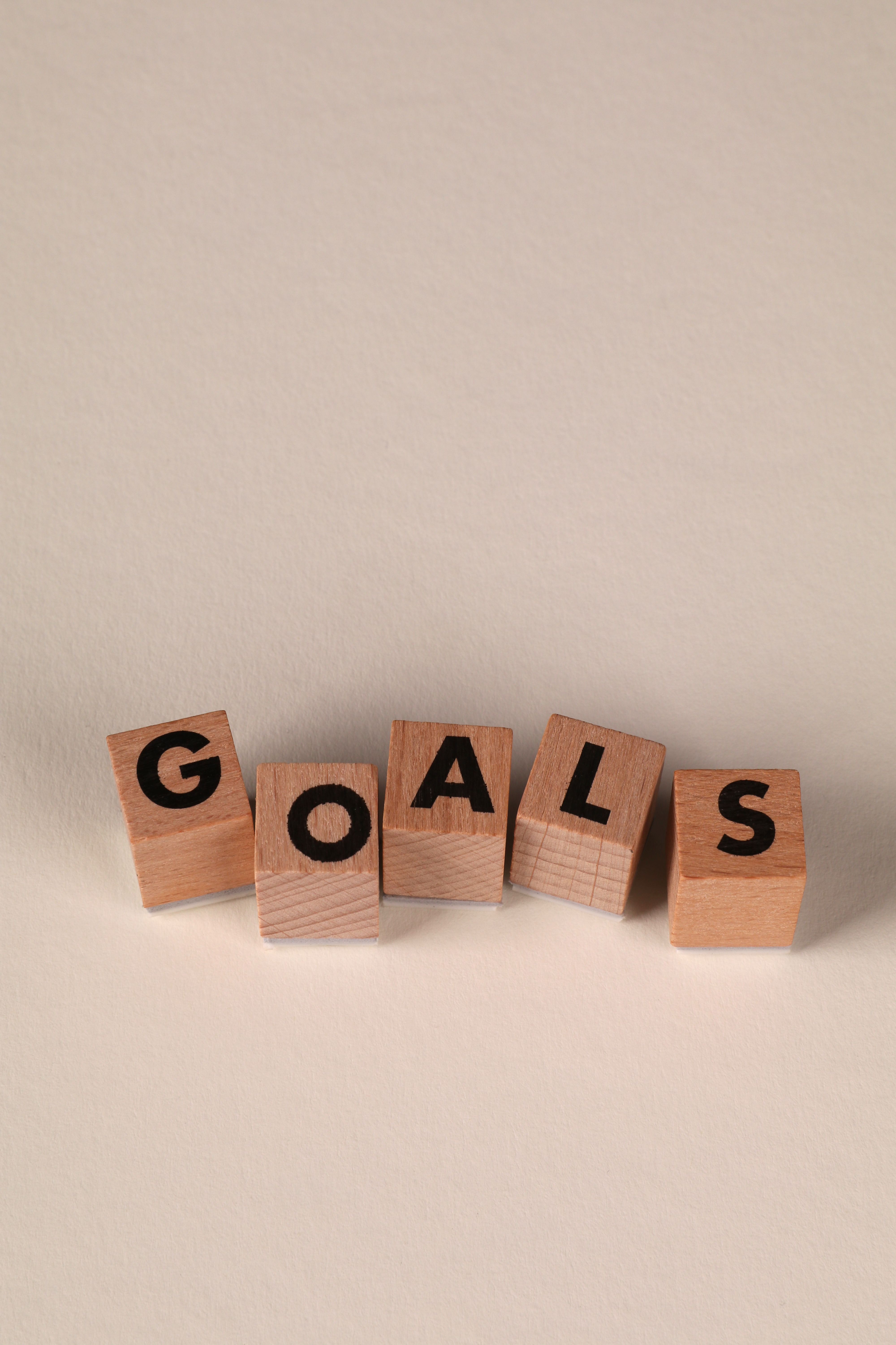 Wooden Block Letter Arrangement Spelling 'Goals' · Free Stock Photo