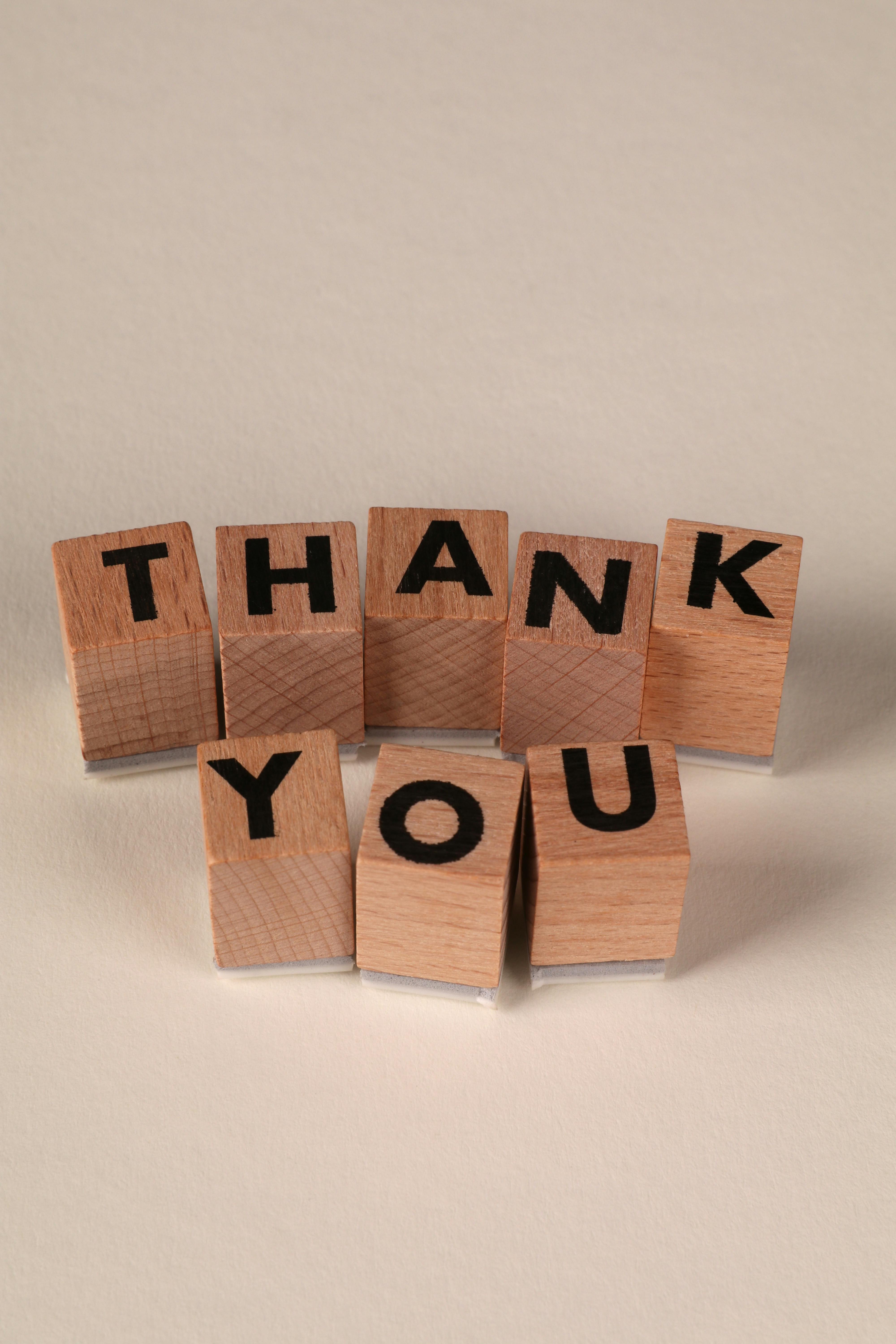 Wooden Block Thank You Text on Neutral Background · Free Stock Photo