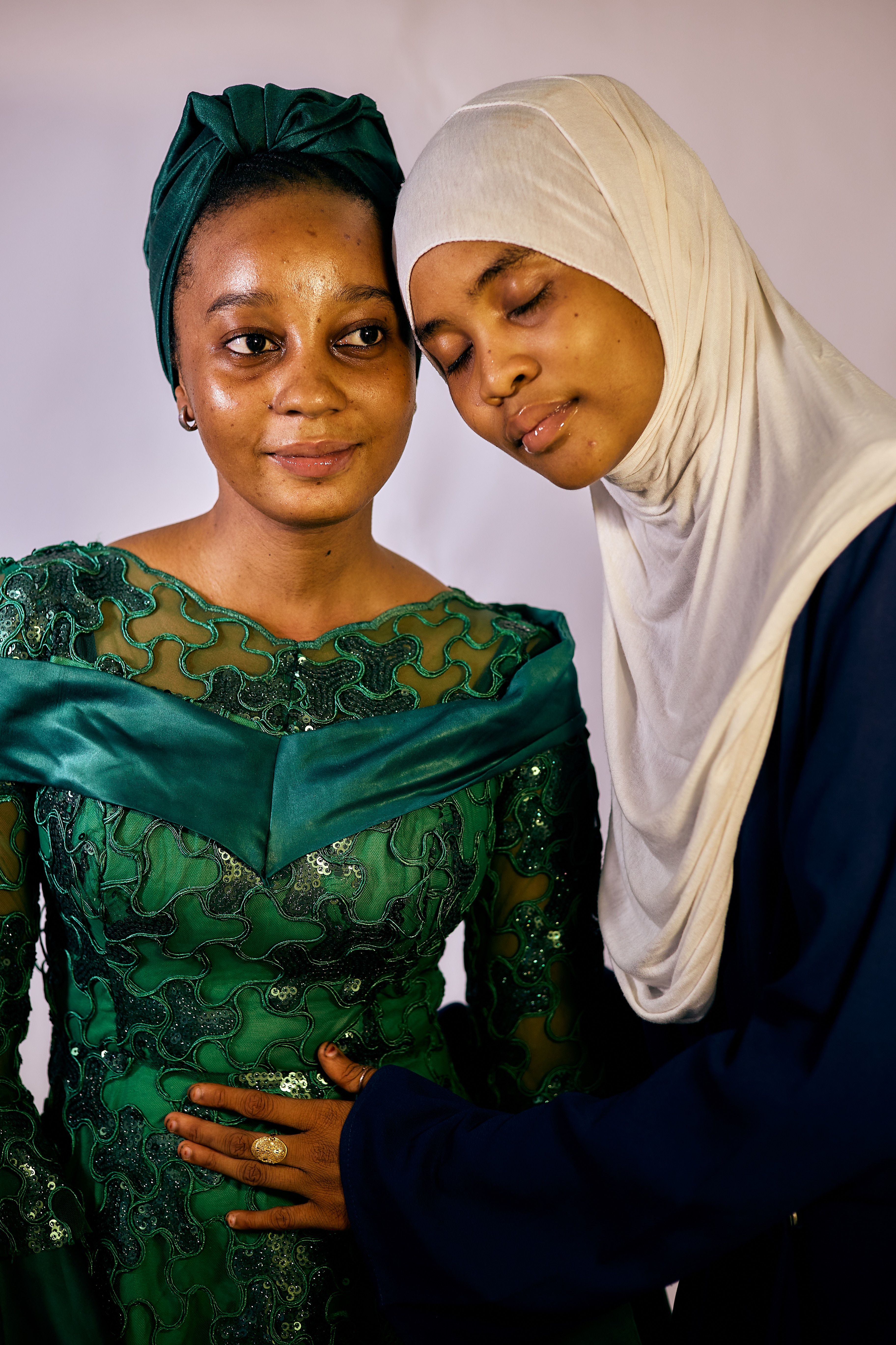 Two Women in Cultural Dress Studio Portrait · Free Stock Photo