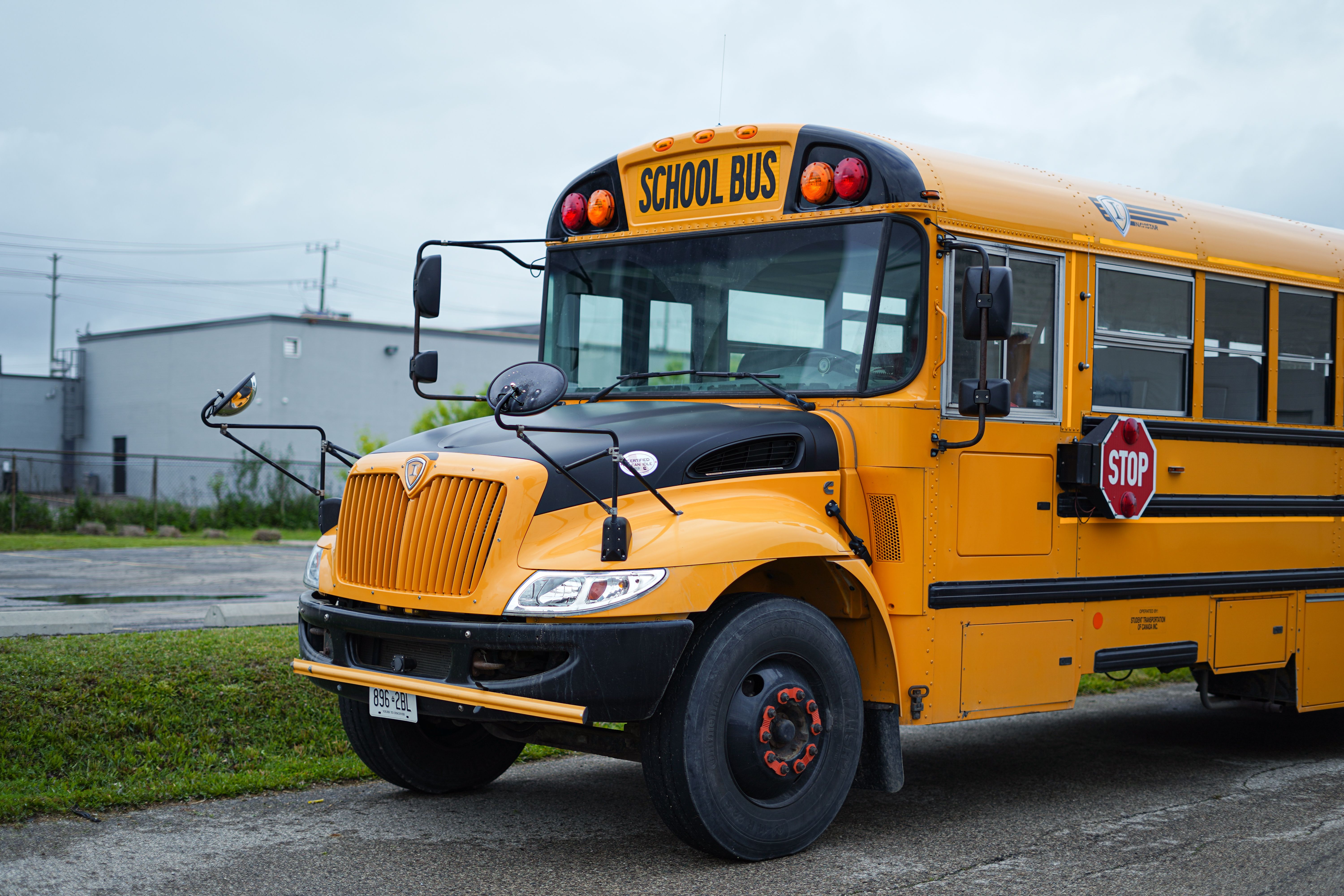 Bright Yellow School Bus in Kitchener, Ontario · Free Stock Photo
