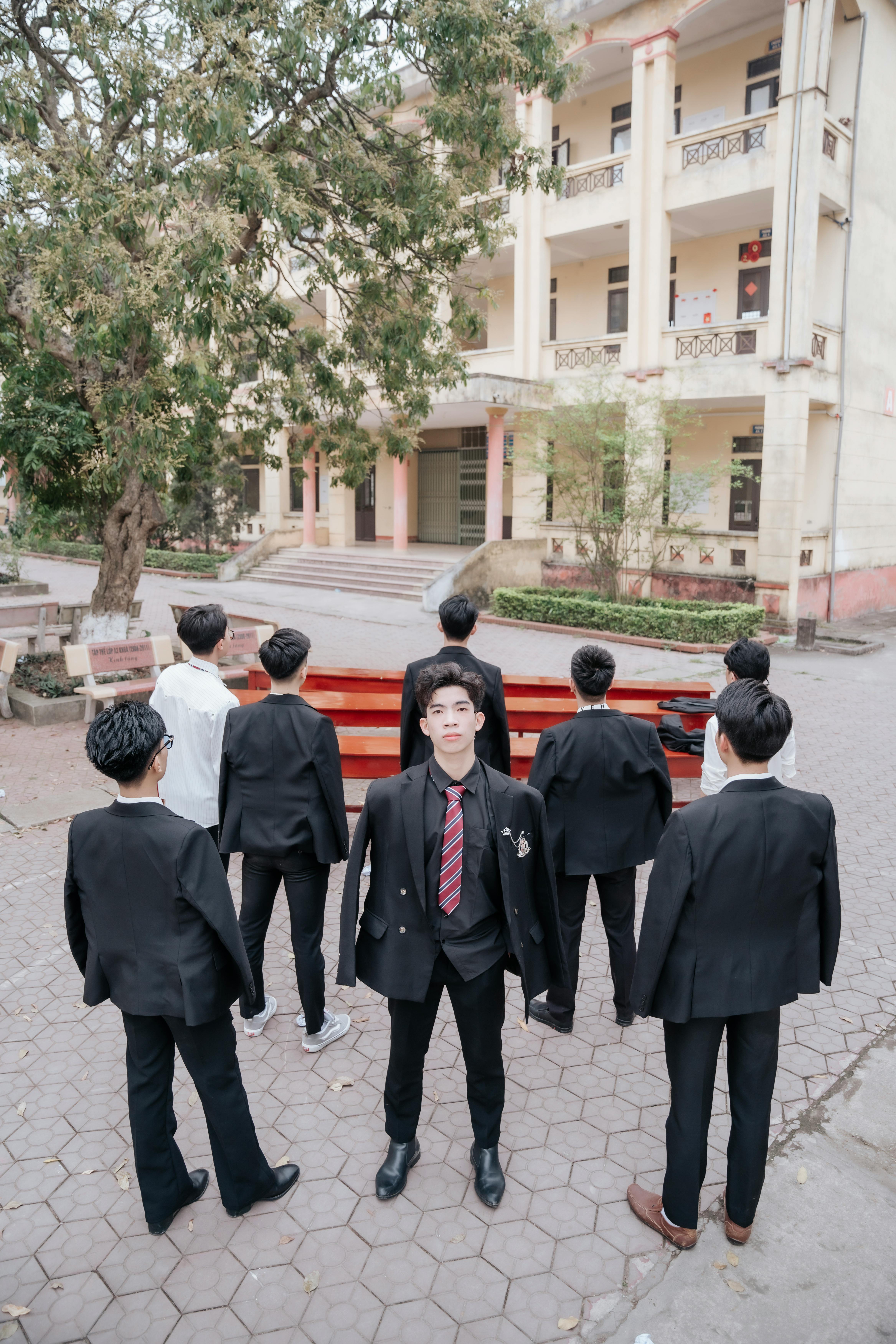 Formal Group Portrait in Courtyard Setting · Free Stock Photo