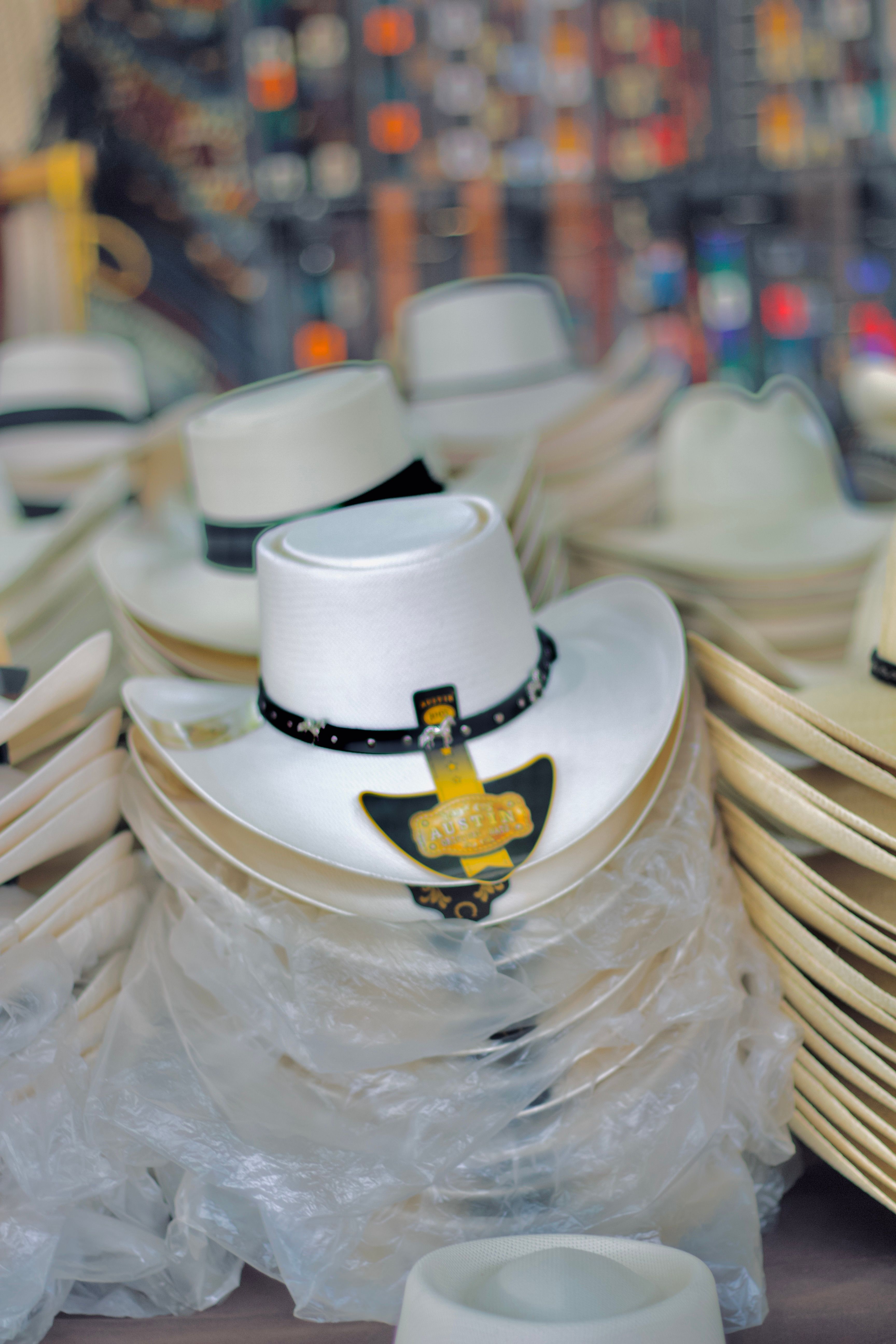 Stack of Stylish Cowboy Hats in a Store · Free Stock Photo