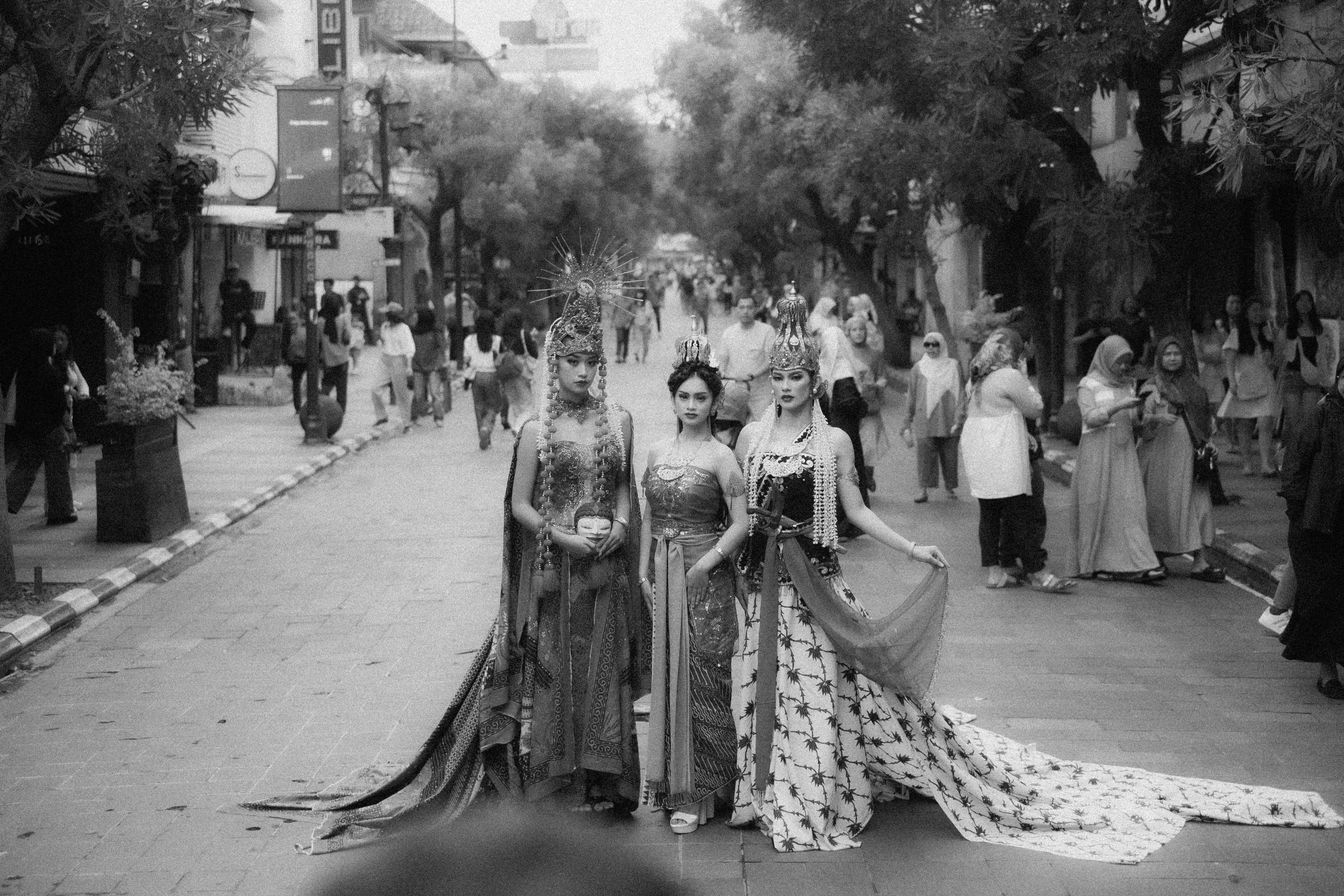 Traditional Indonesian Fashion on Historic Braga Street · Free Stock Photo