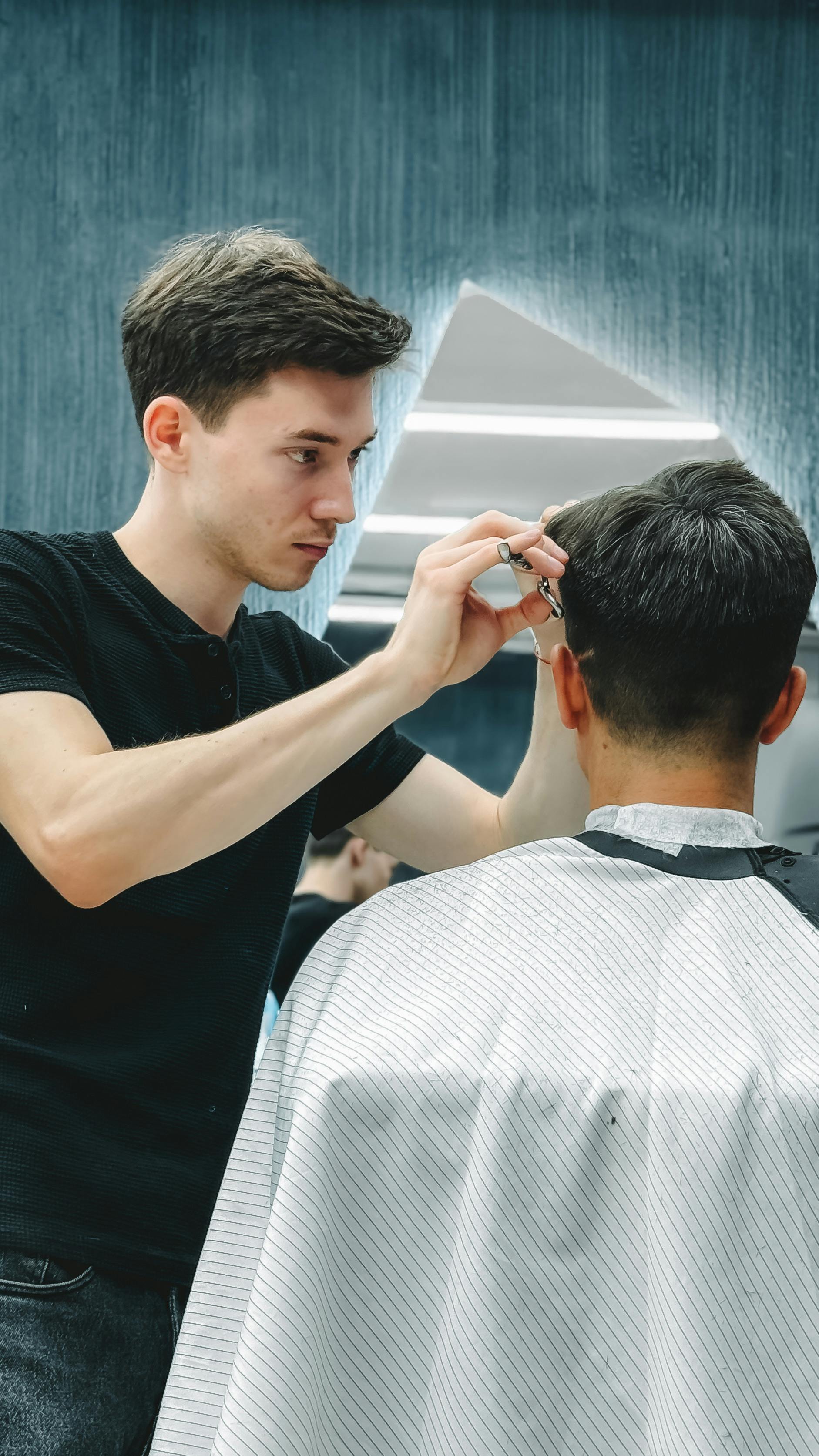 Barber Using Hair Spray · Free Stock Photo