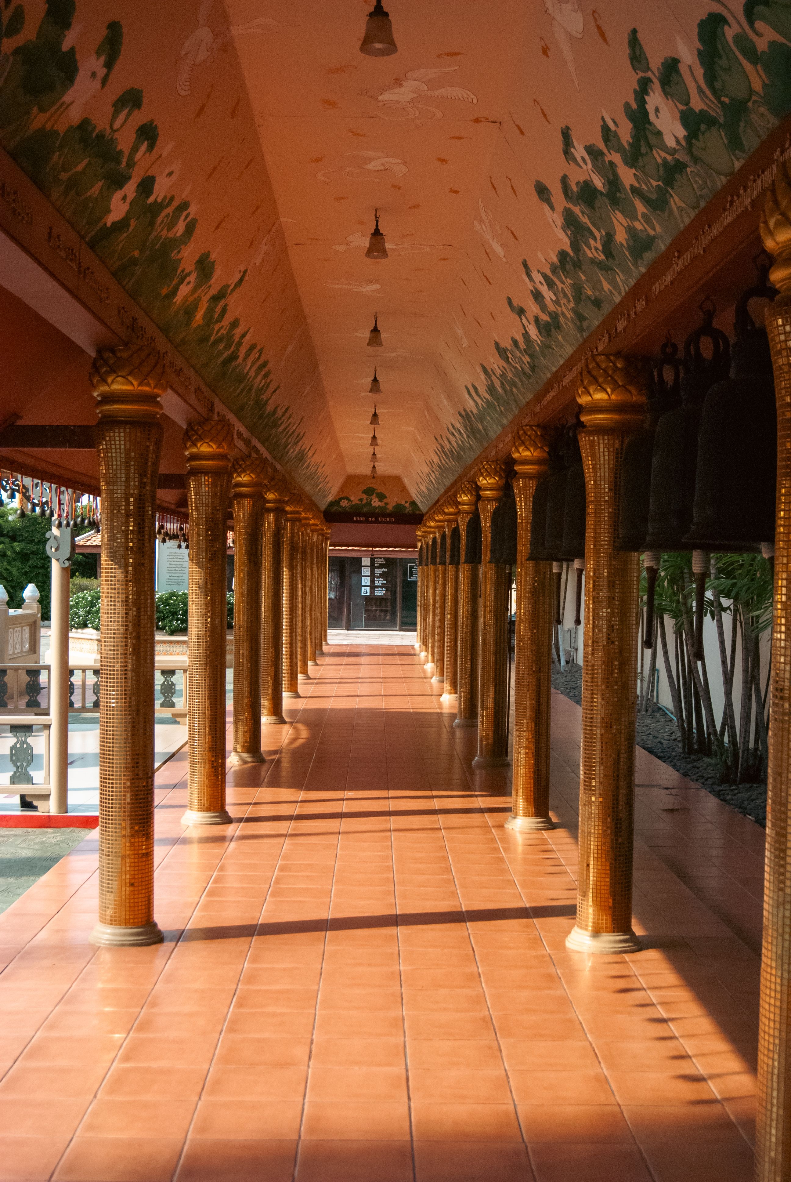 Golden Column Walkway in a Buddhist Temple · Free Stock Photo