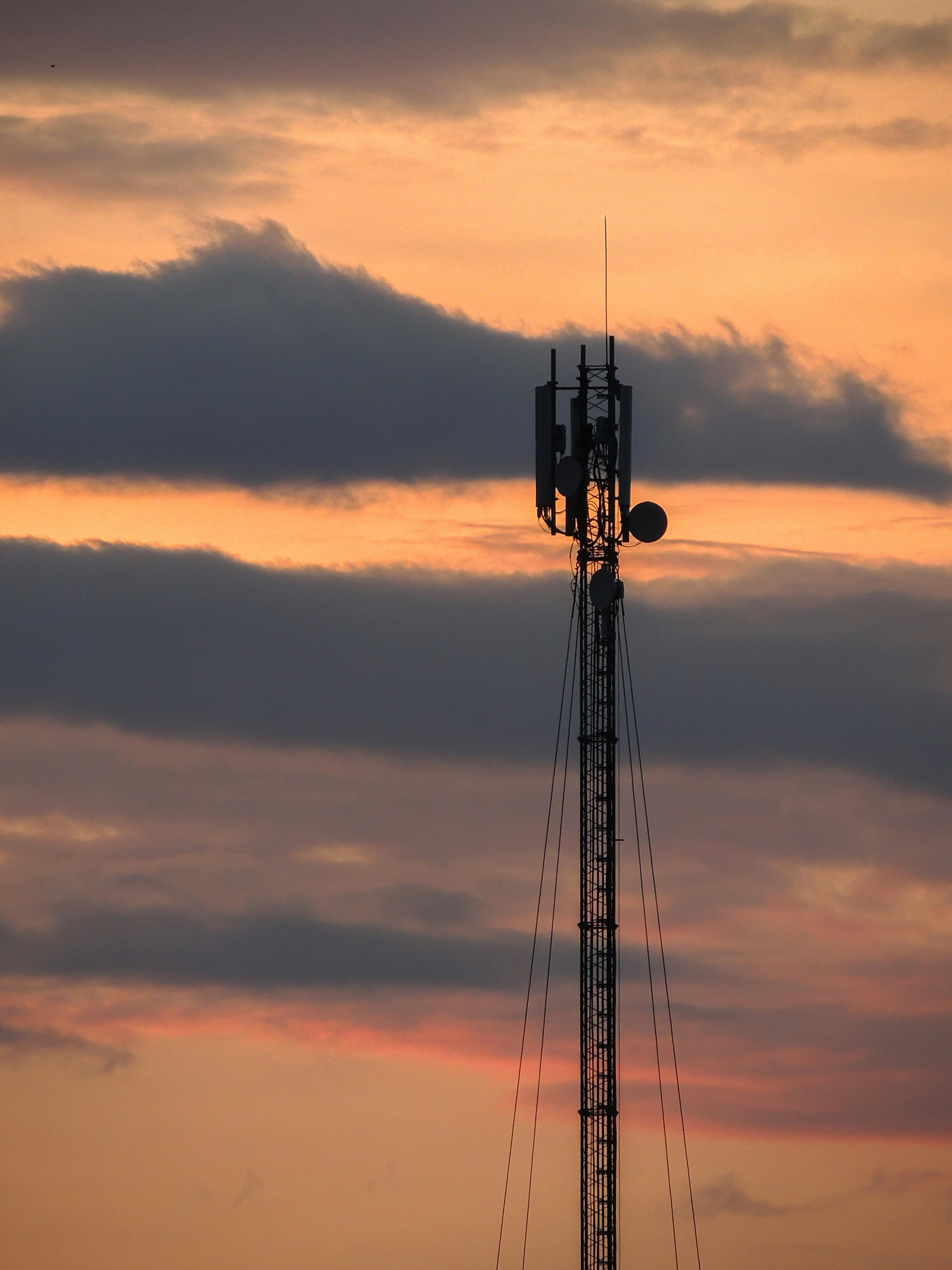 Telecommunication Tower Against Sunset Sky · Free Stock Photo