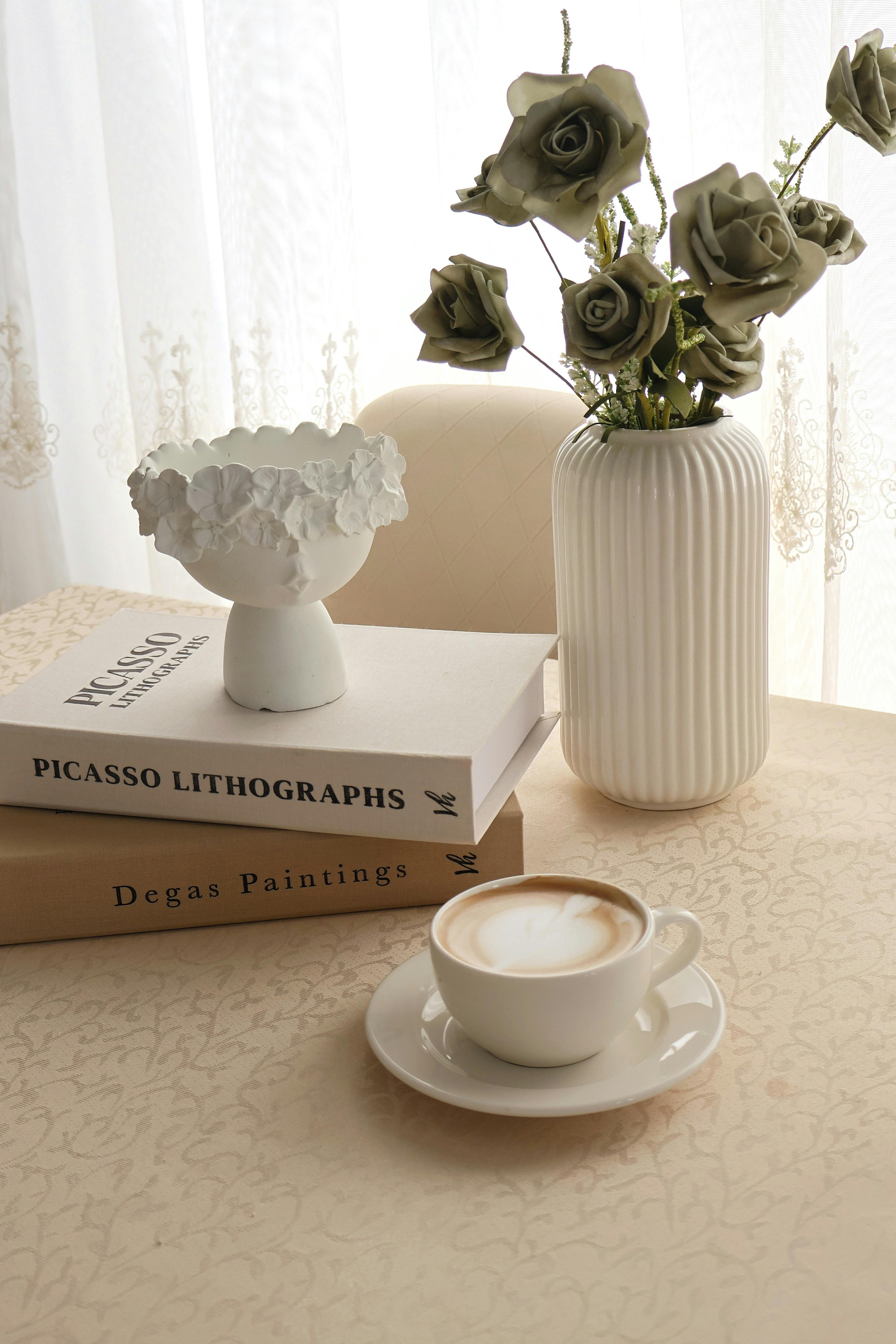 Elegant Coffee Table Setting with Books and Flowers · Free Stock Photo