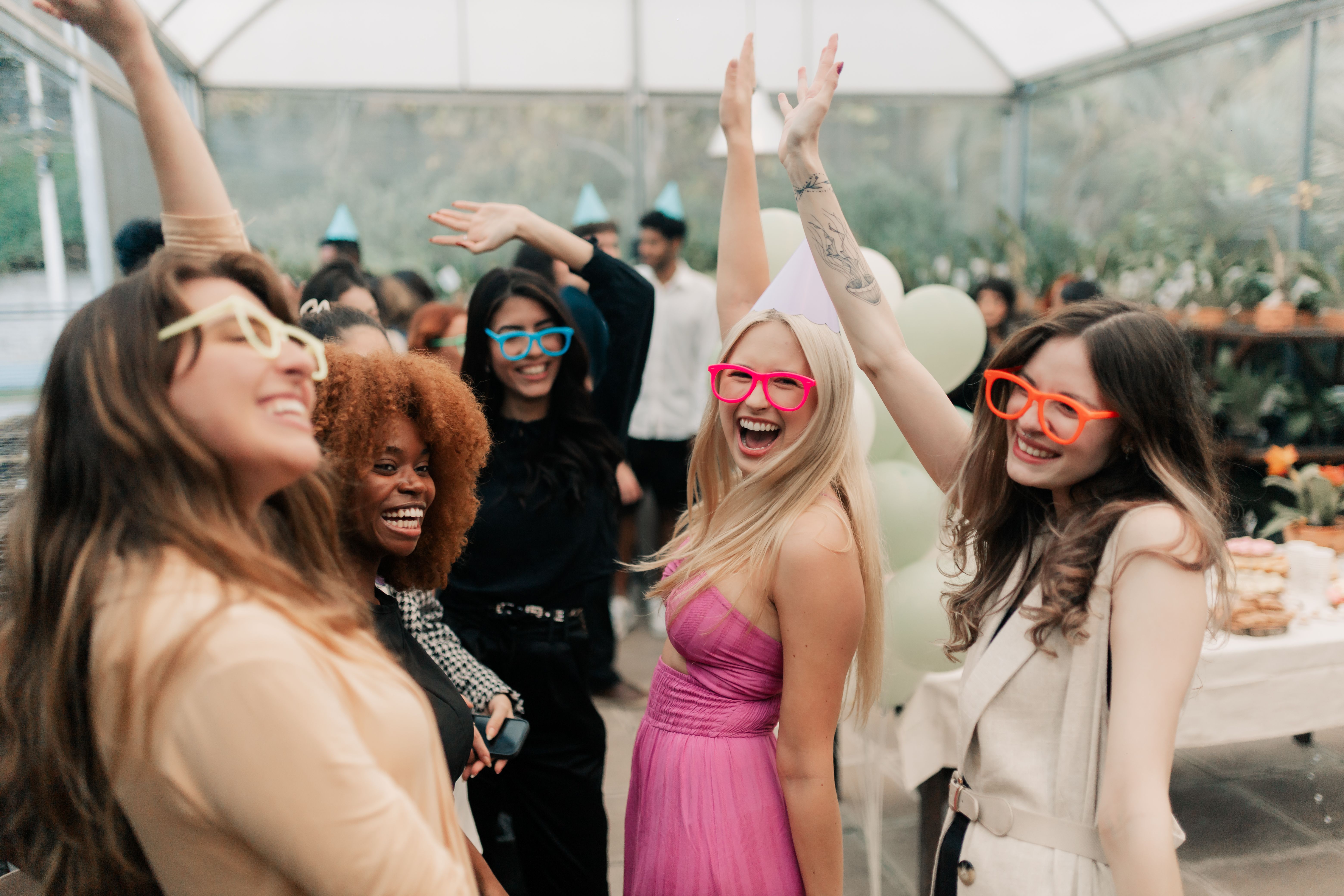 Vibrant Indoor Party Celebration with Friends — Photo by Alexander Mass ...