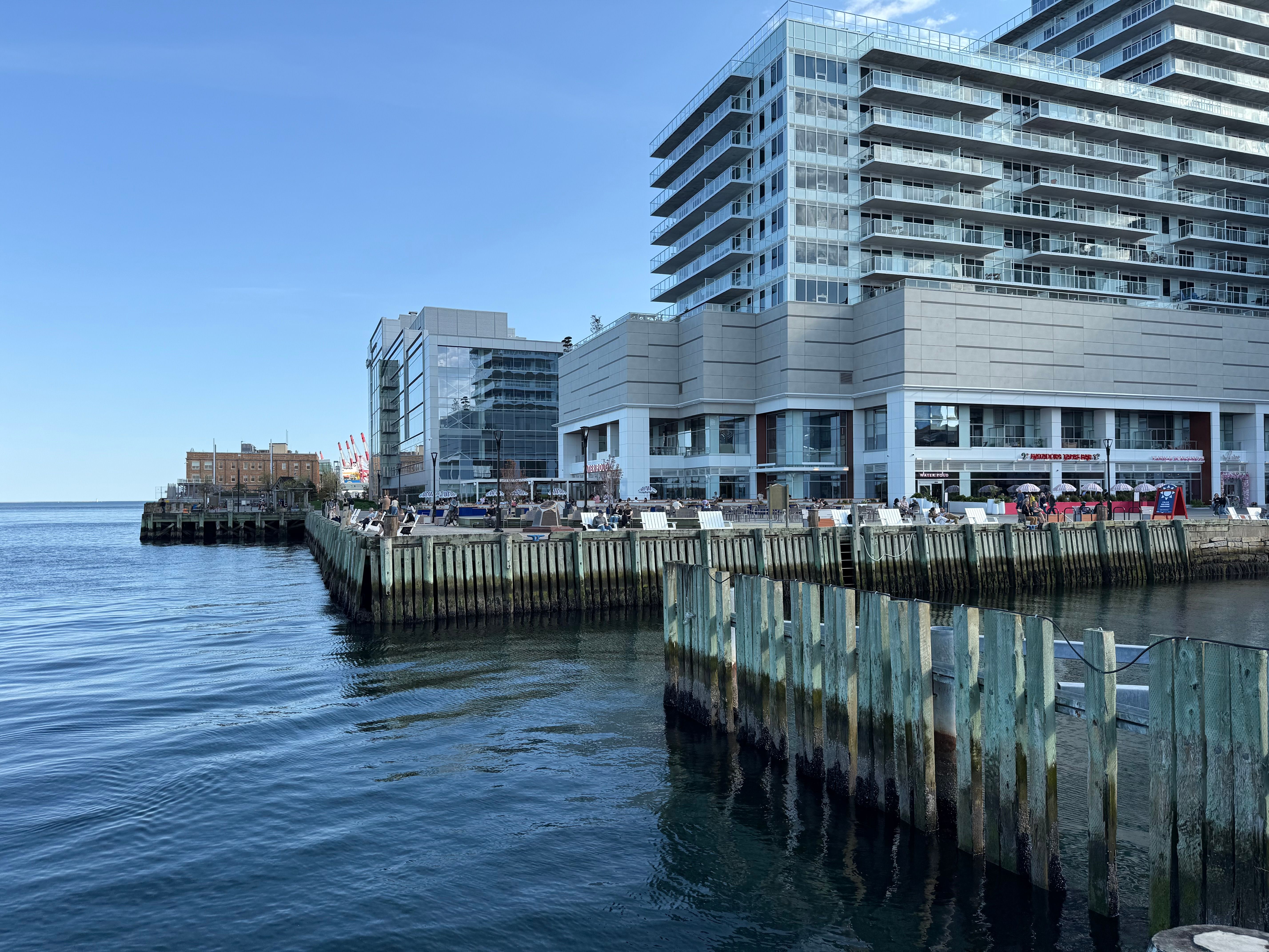 Modern Waterfront Buildings with Large Dock Area · Free Stock Photo