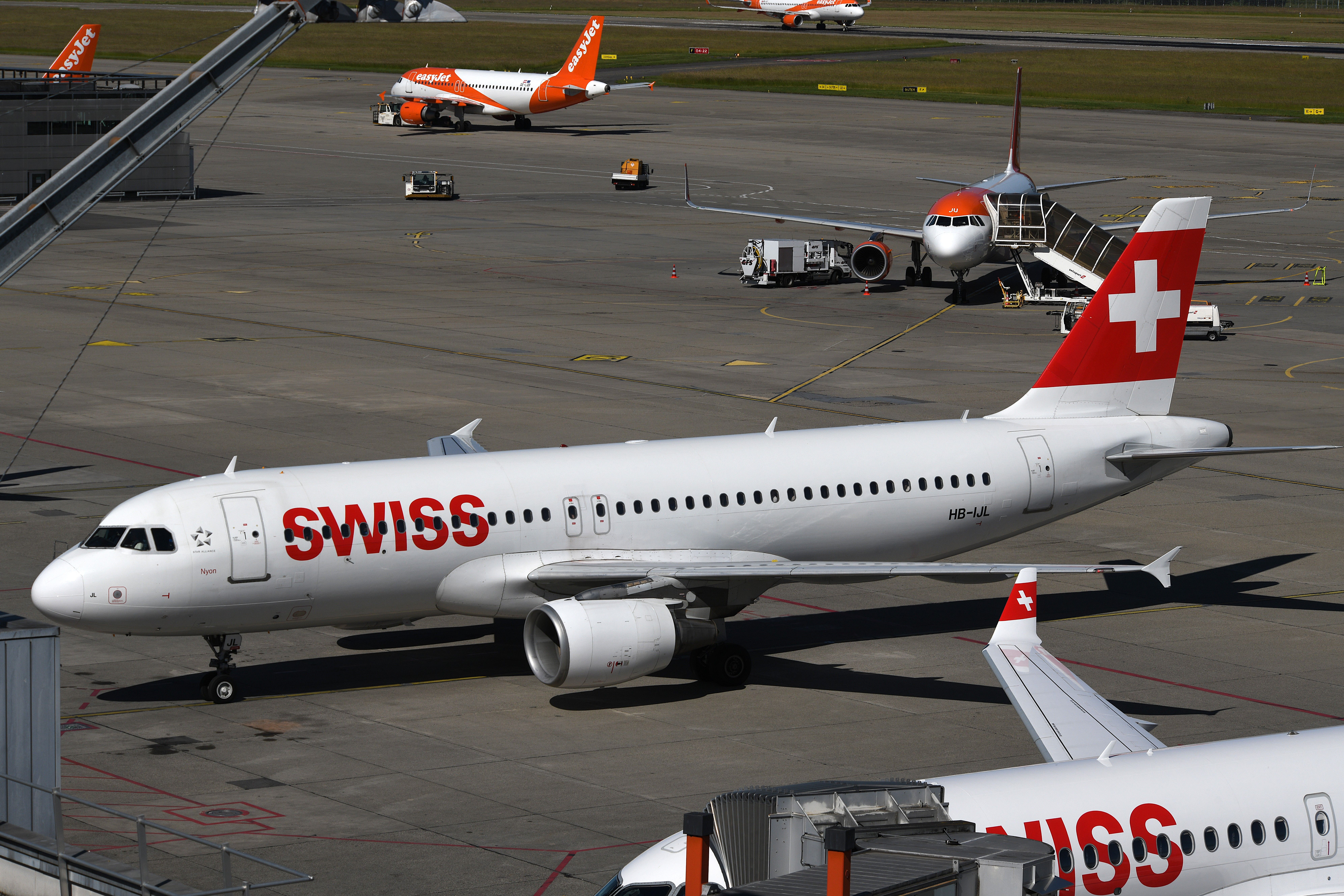 Swiss Airlines Aircraft at Genève Airport on Tarmac · Free Stock Photo