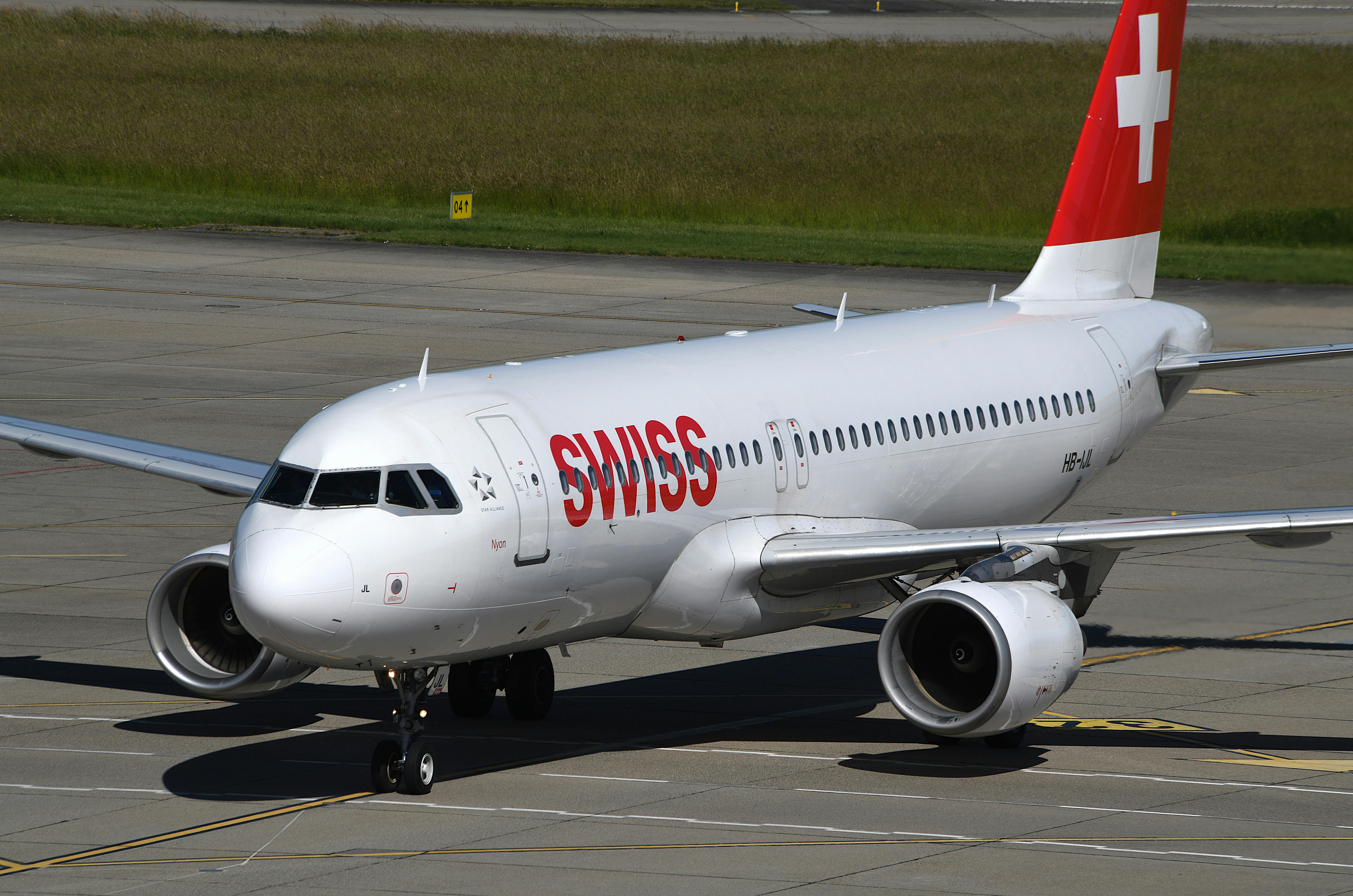 Swiss Aircraft on Tarmac at Geneva Airport · Free Stock Photo