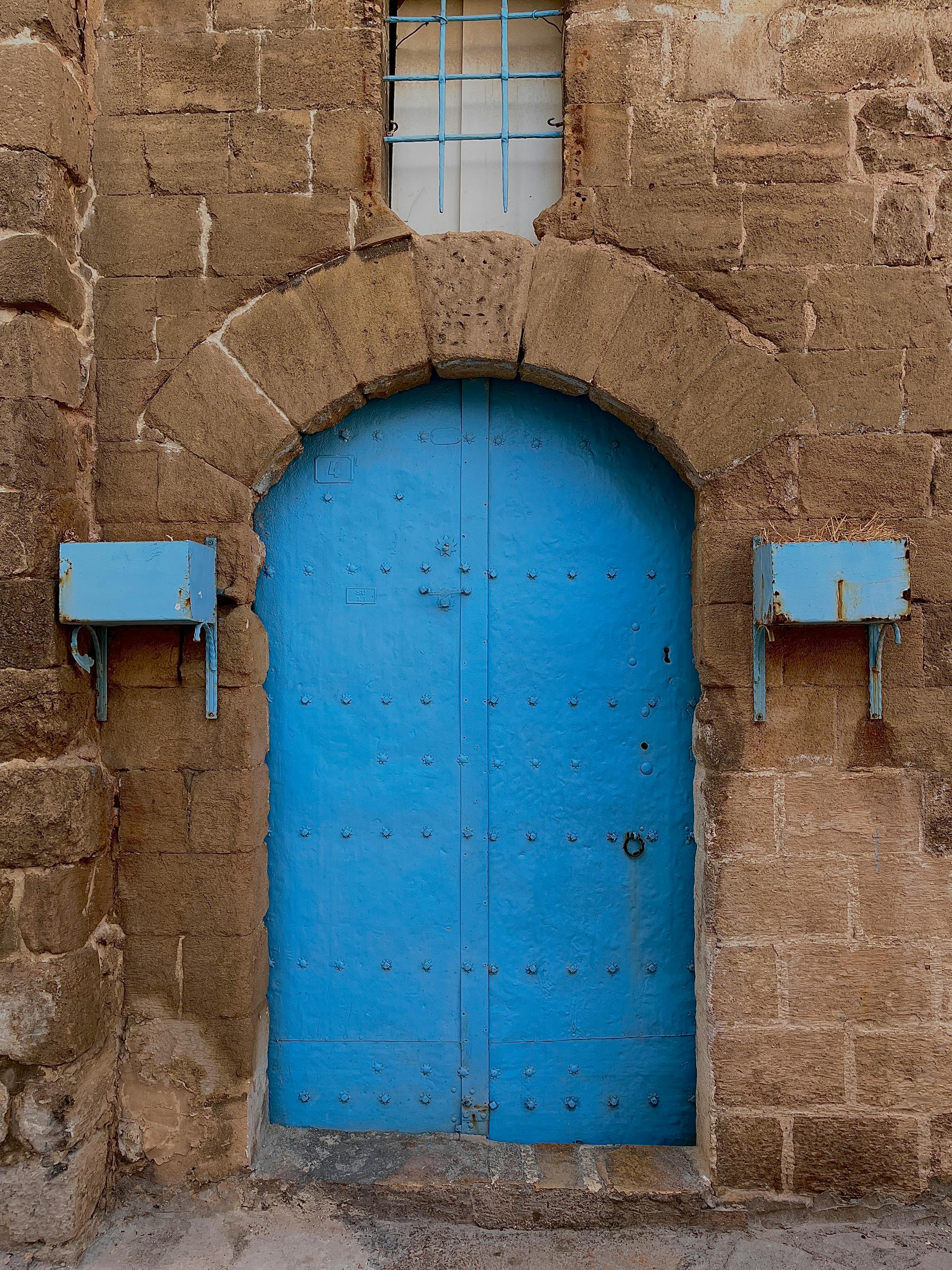 Rustic Blue Door in Stone Wall Architecture · Free Stock Photo