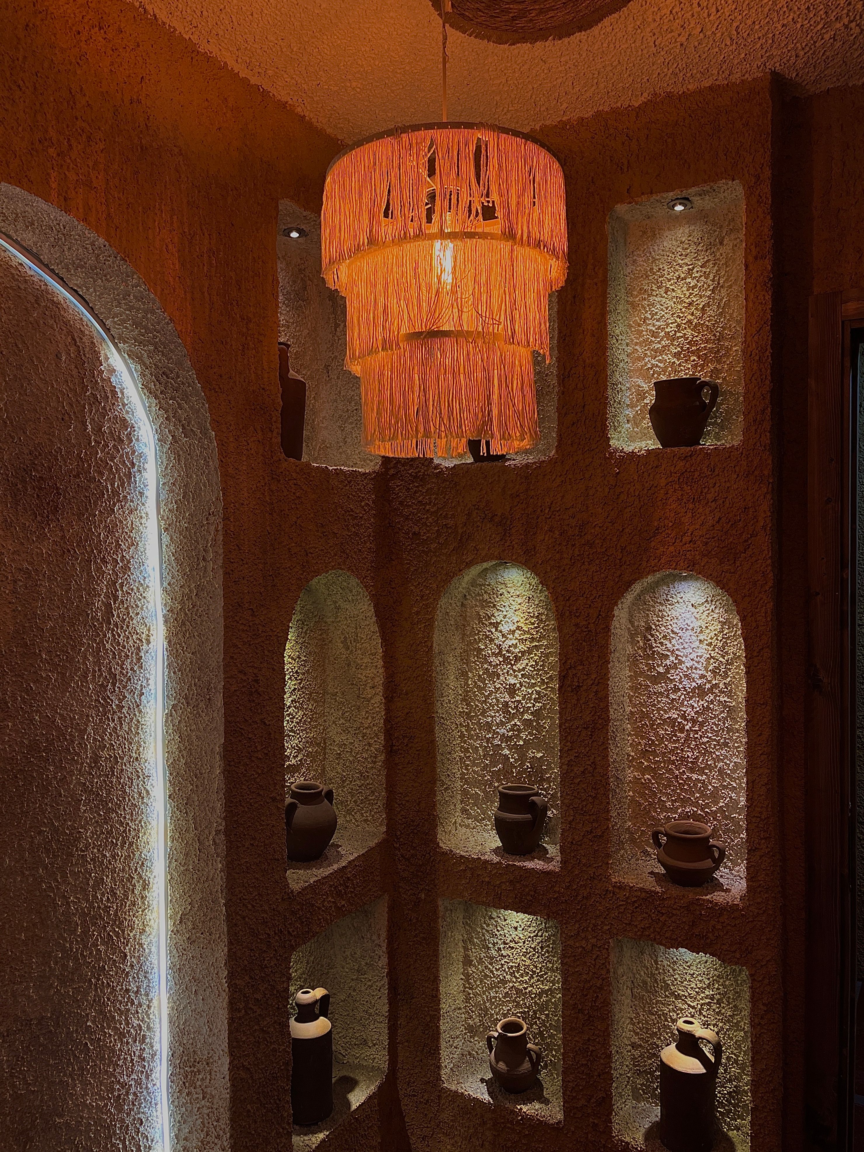Cozy Rustic Interior with Clay Pots and Lamps · Free Stock Photo