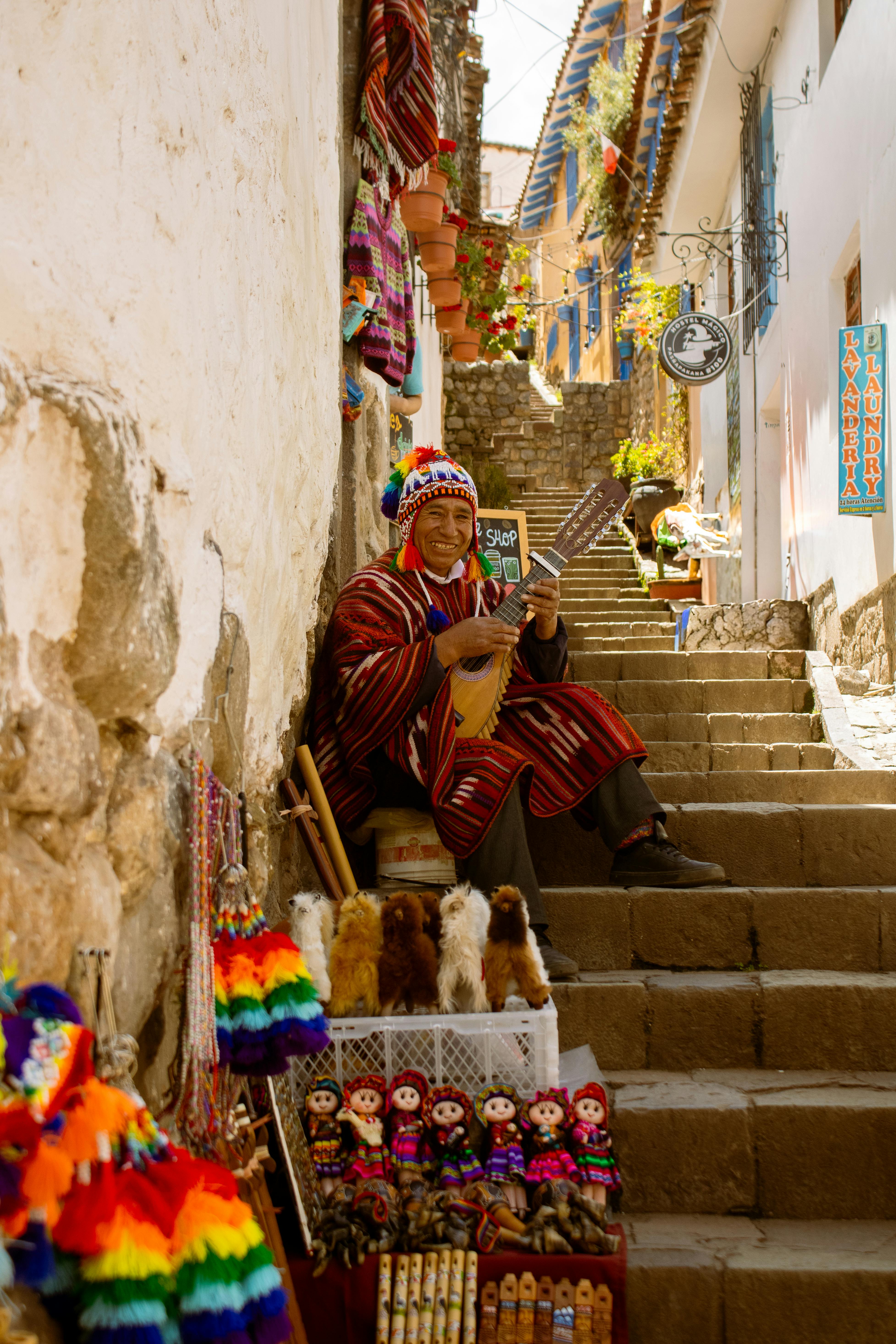 Traditional Musician Performing on Cusco Street · Free Stock Photo