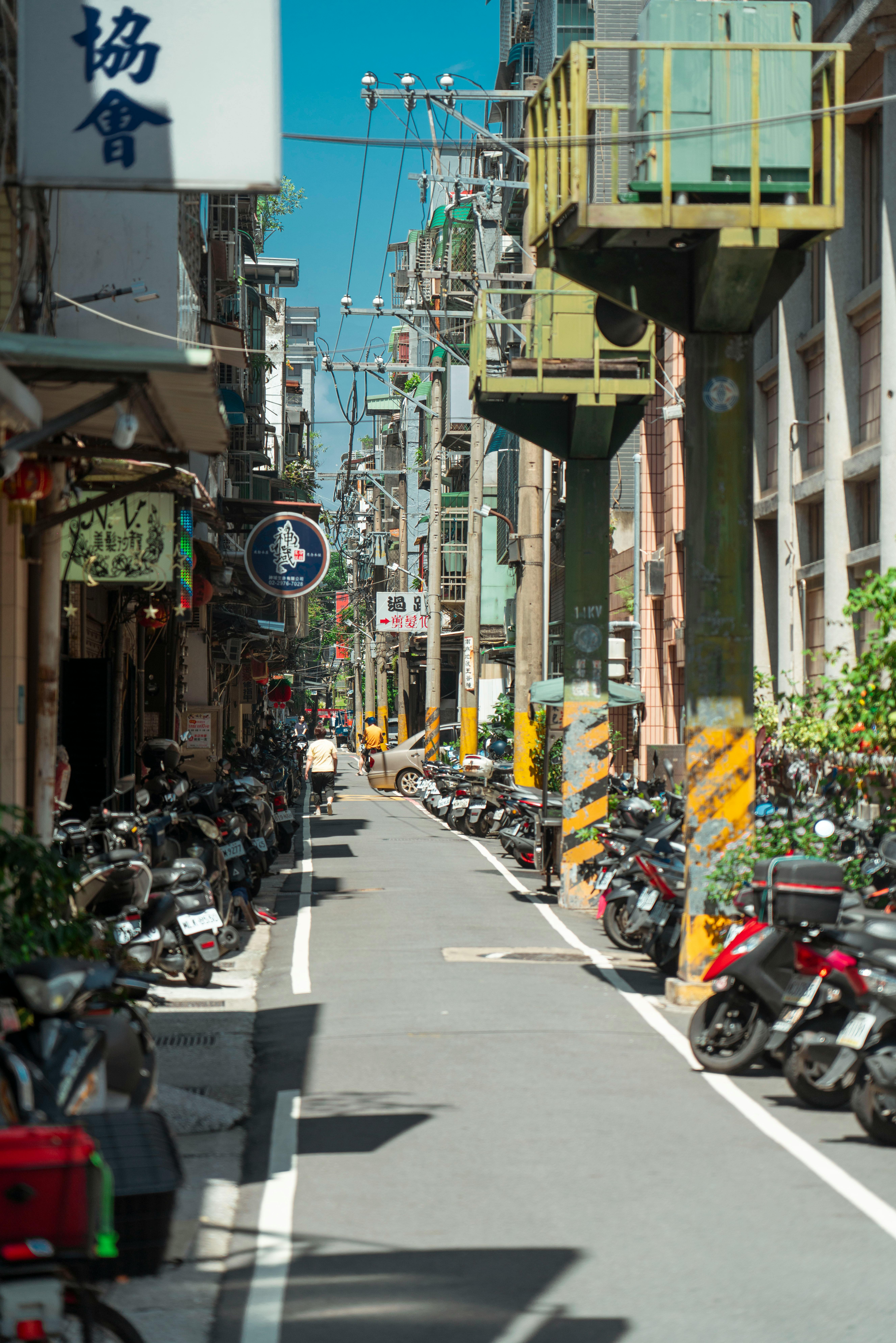 Vibrant Alley in Taipei with Scooters · Free Stock Photo