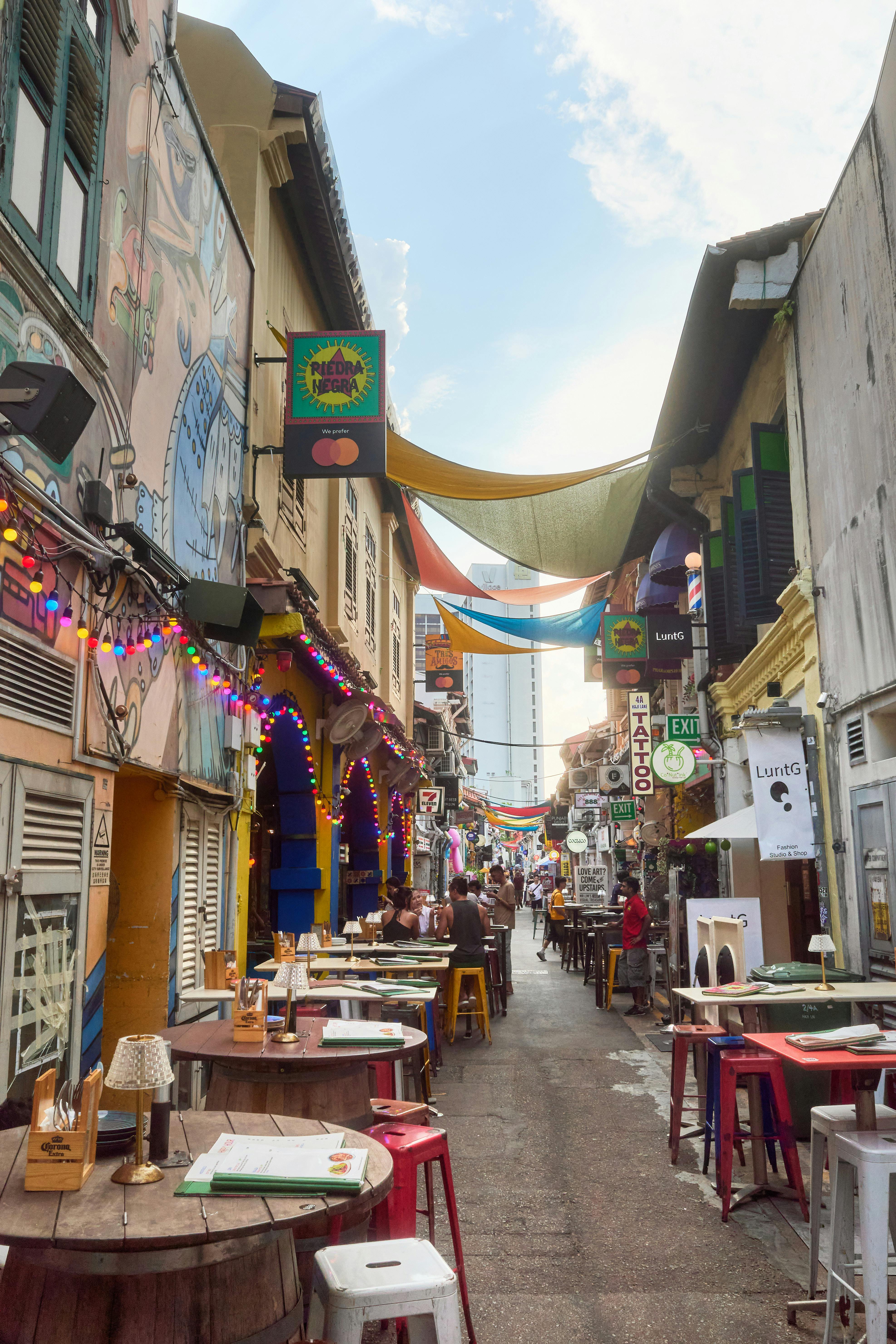 Colorful Street in Bugis, Singapore with Outdoor Cafes · Free Stock Photo