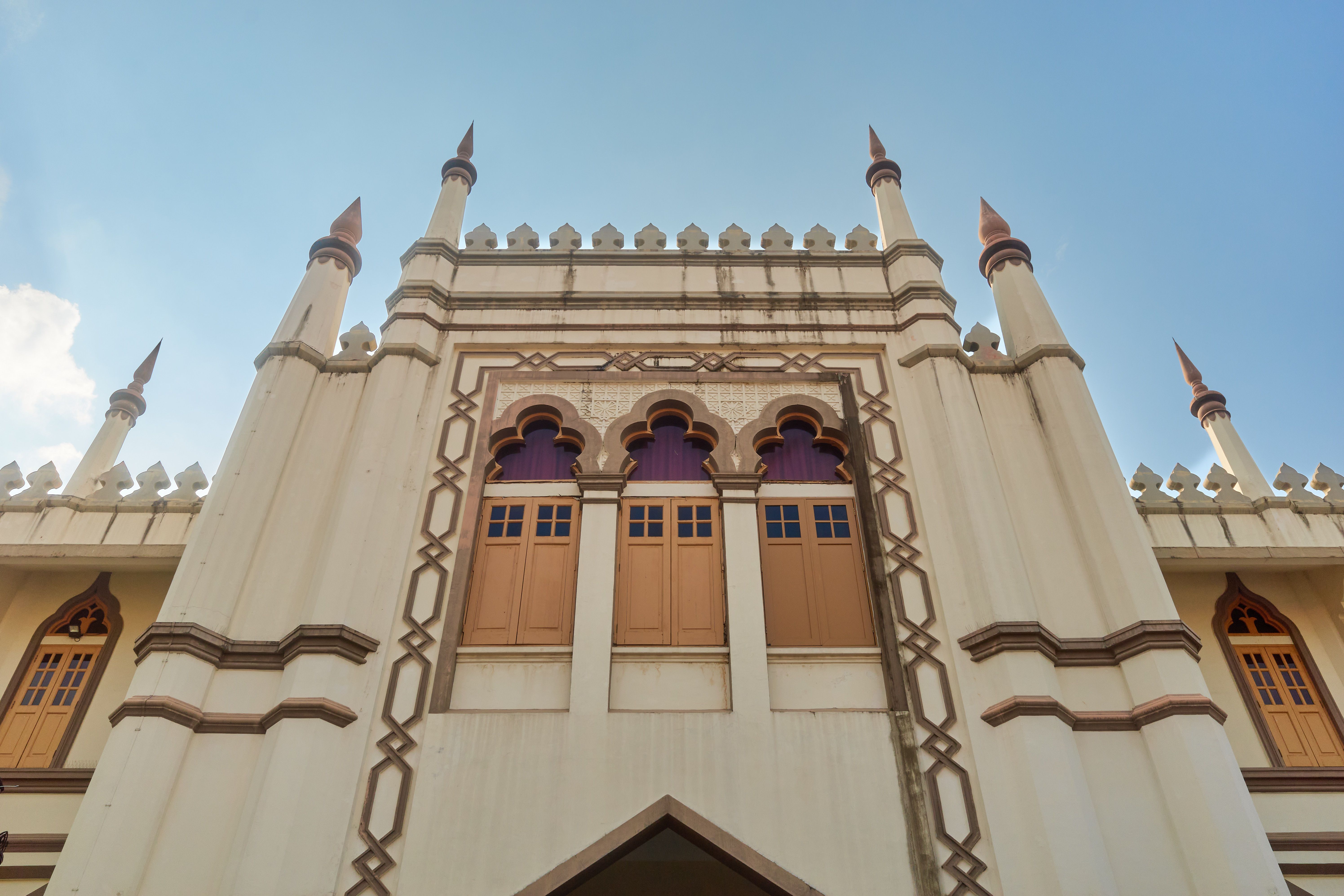 Elegant Architecture with Ornate Gothic Windows · Free Stock Photo