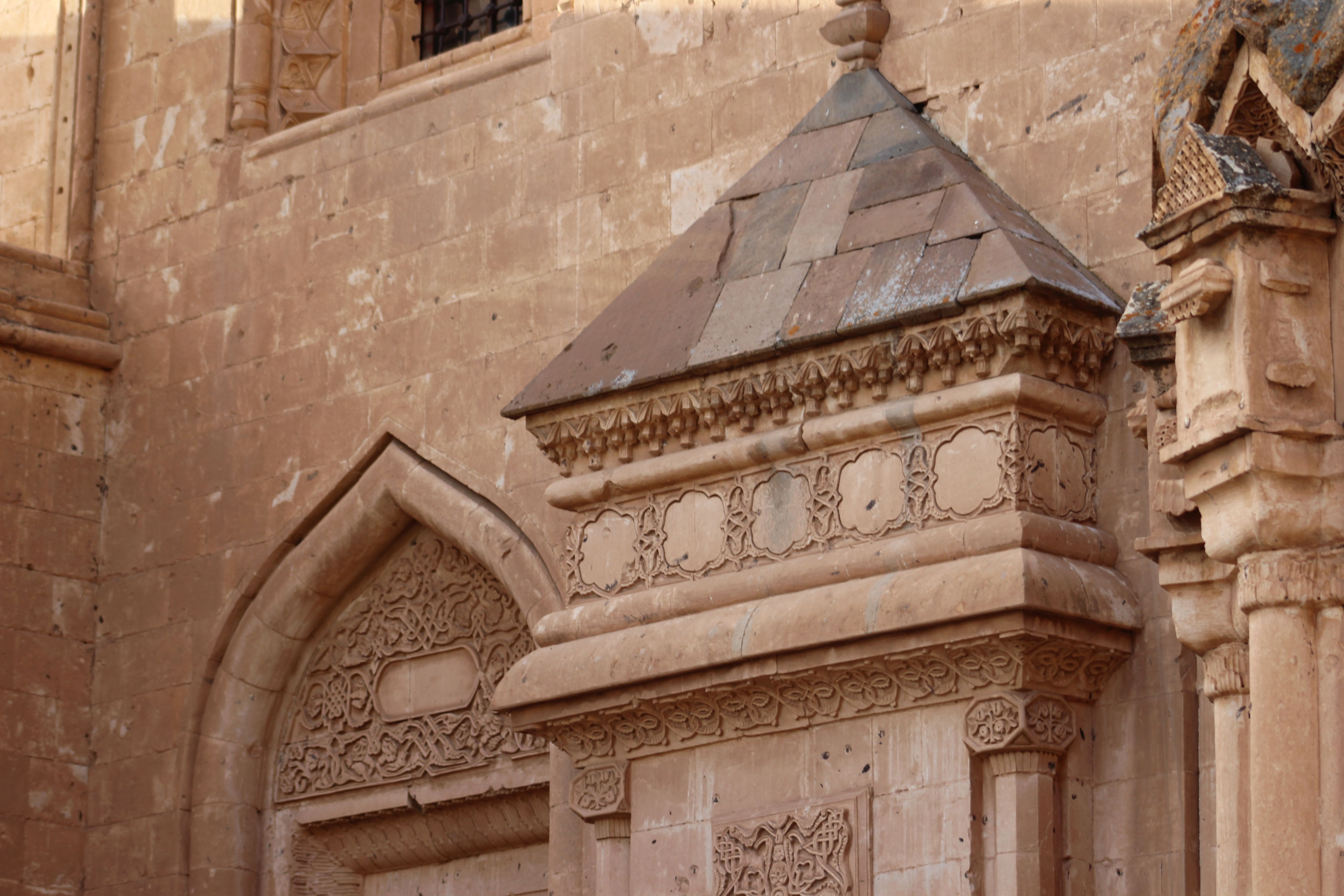 Ancient Stone Architecture with Intricate Carvings · Free Stock Photo