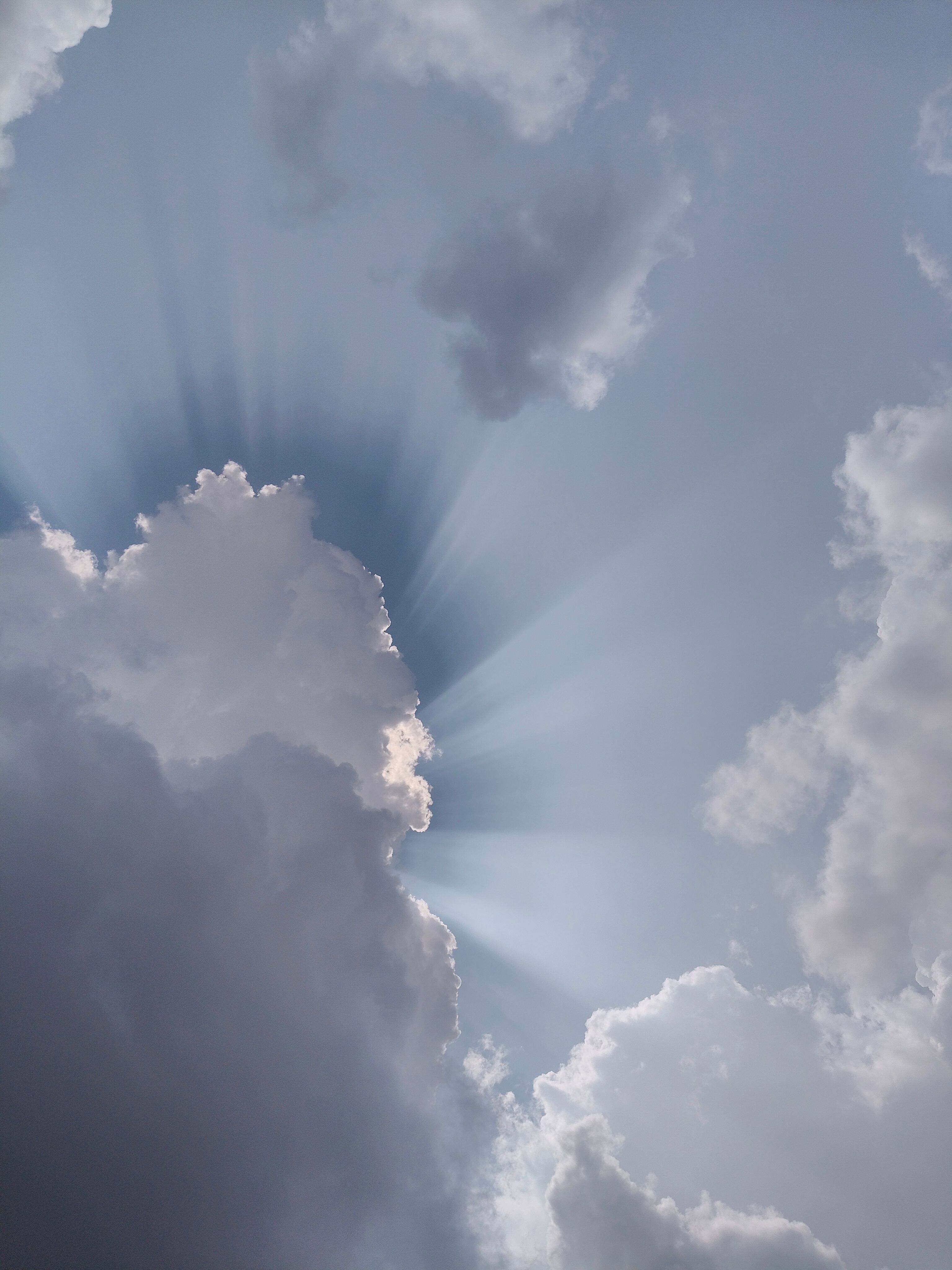 Dramatic Sun Rays Breaking Through Clouds · Free Stock Photo