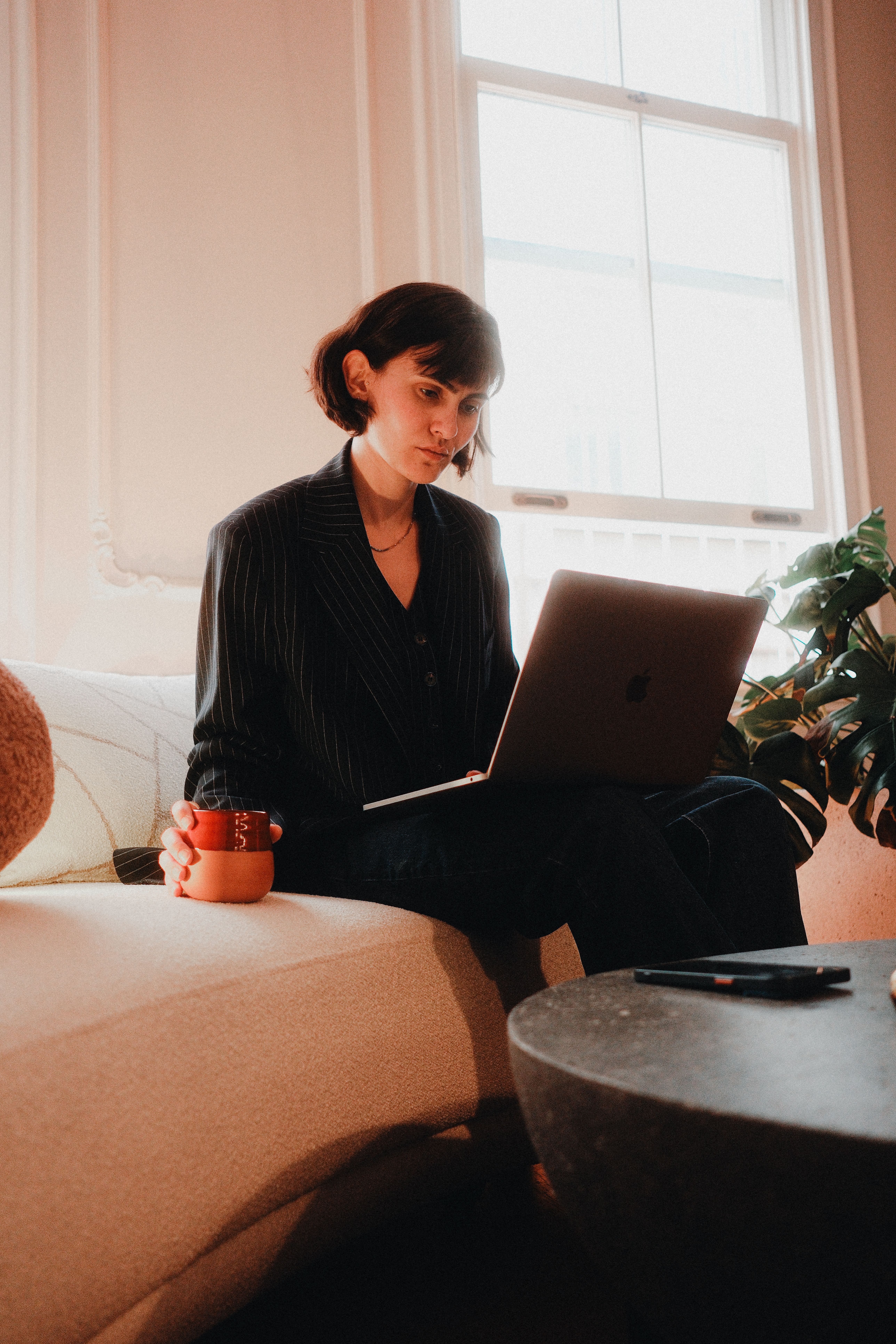 Woman Working from Home in Cozy Setting · Free Stock Photo