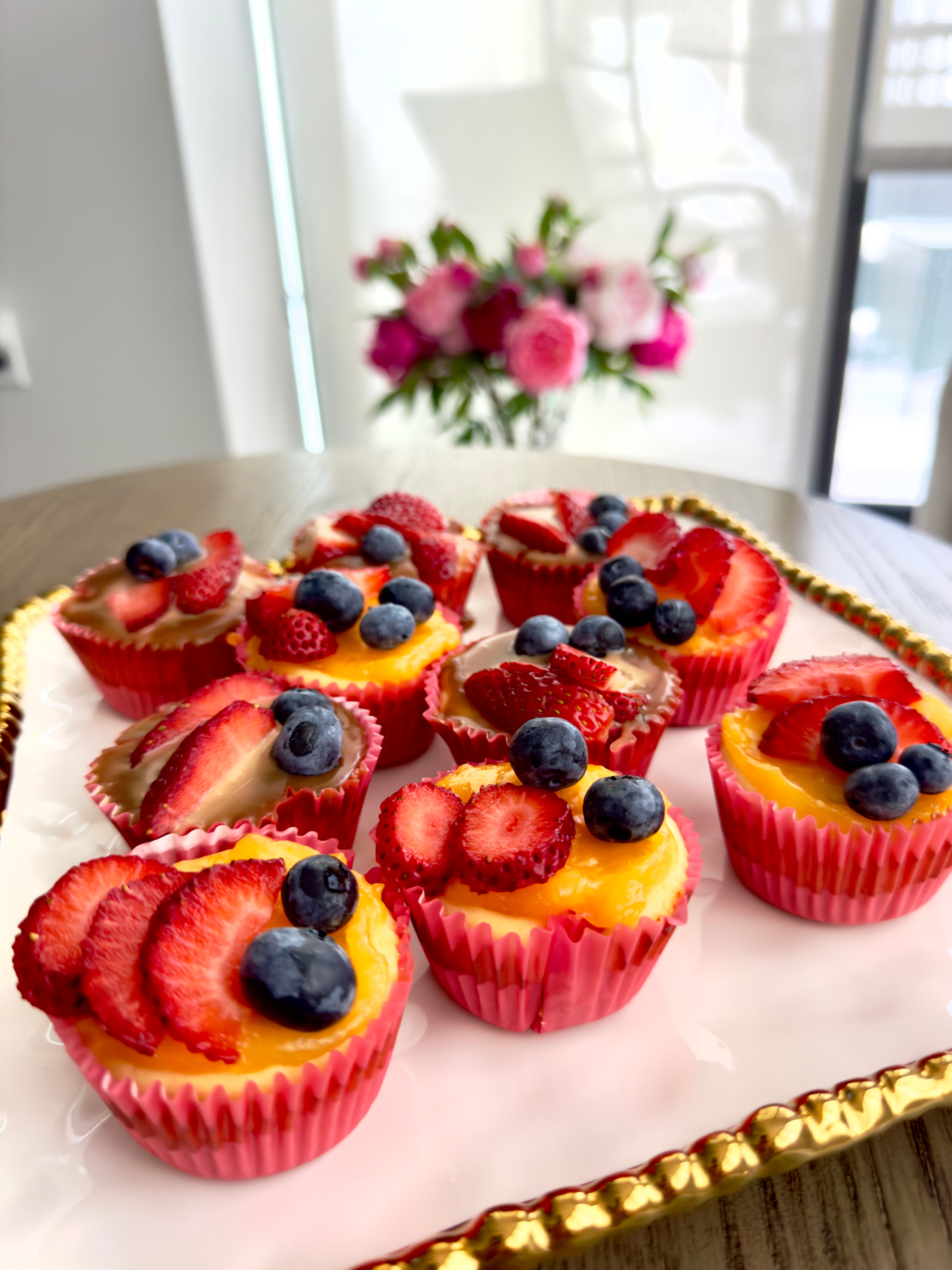 Vibrant Fruit Topped Cupcakes on Elegant Tray · Free Stock Photo