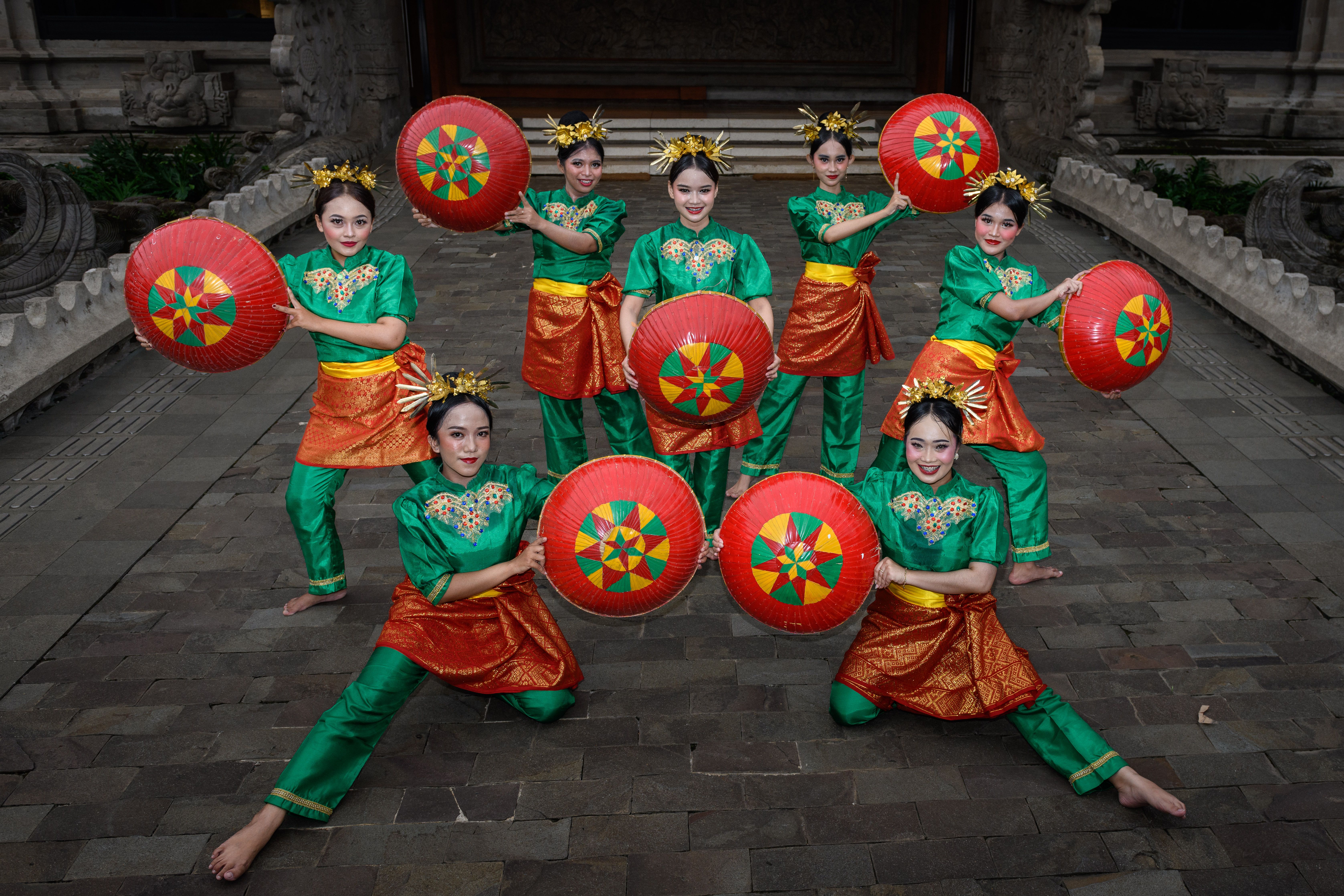 Traditional Dance Group with Colorful Umbrellas · Free Stock Photo