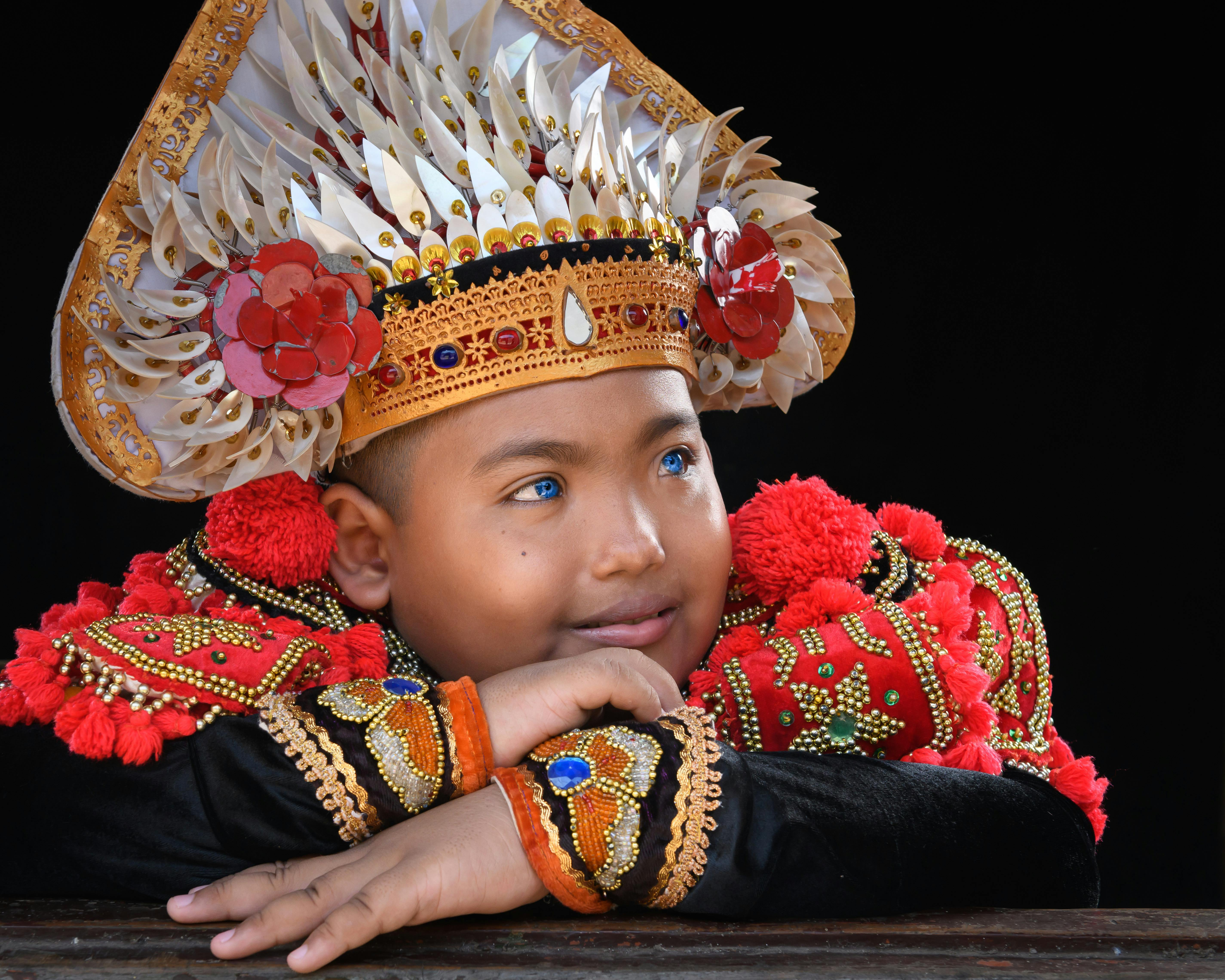 Child in Traditional Indonesian Costume Portrait · Free Stock Photo