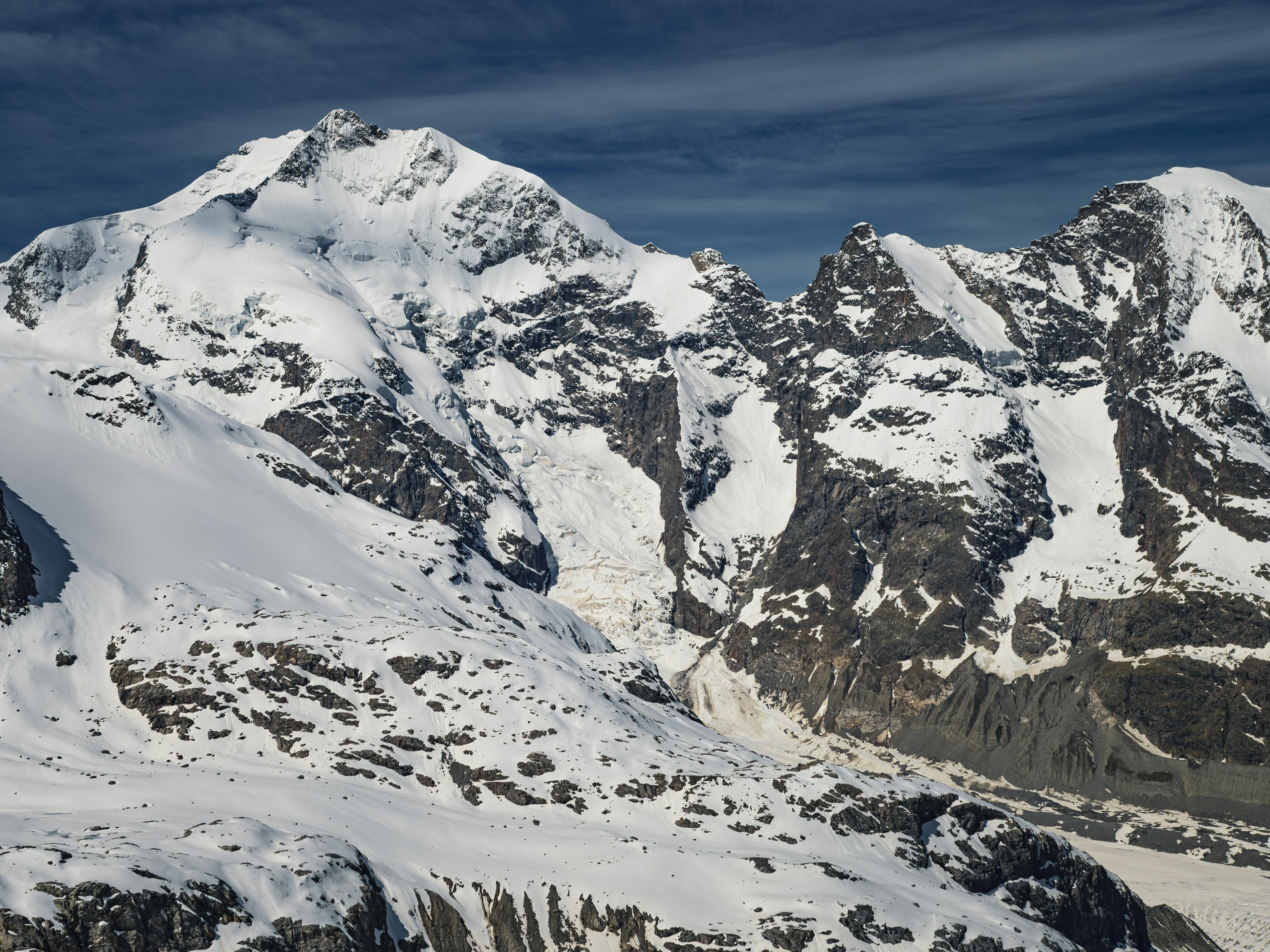 Majestic Snow-Capped Swiss Alps in Winter · Free Stock Photo