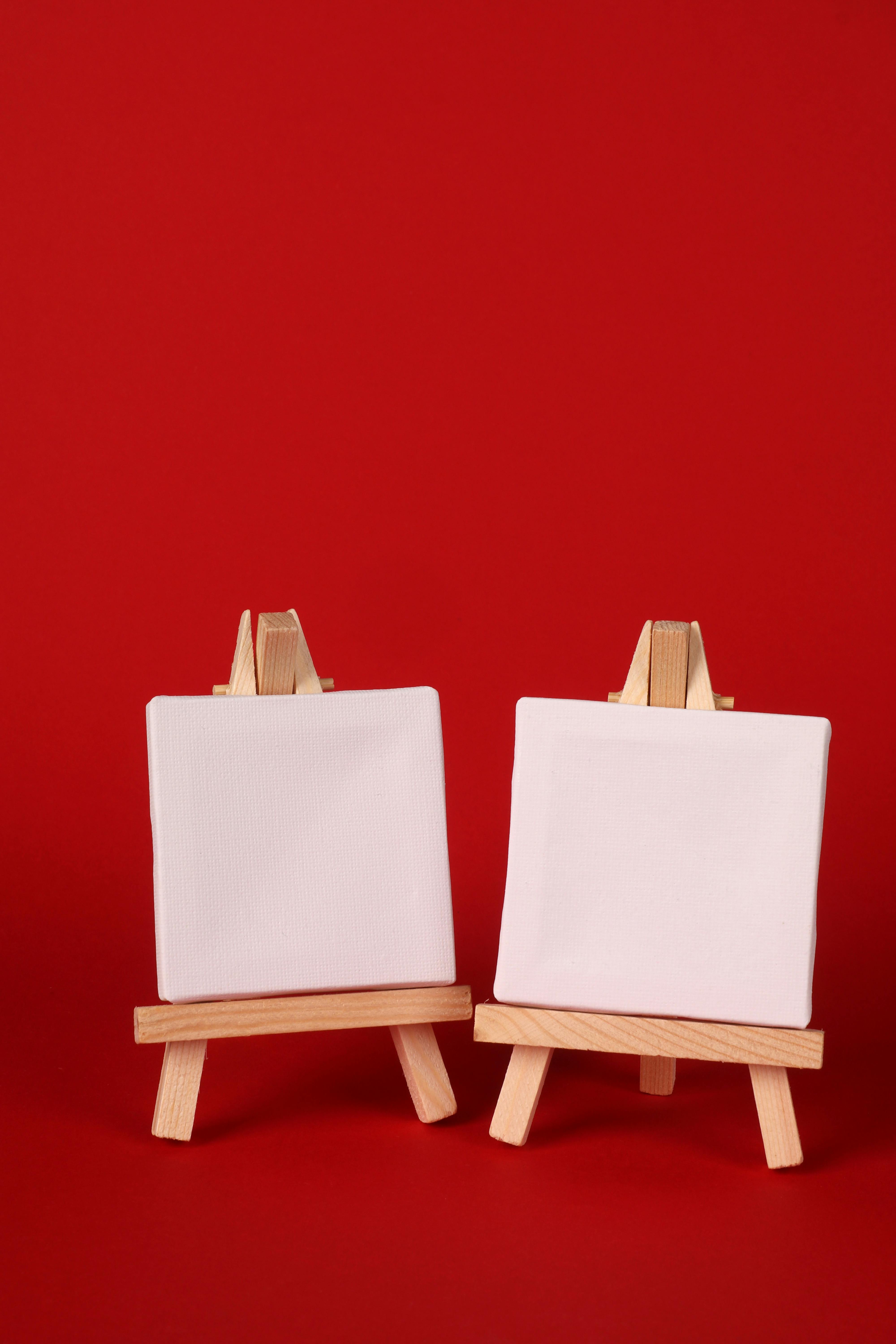 Dual Mini Easels on Red Background · Free Stock Photo