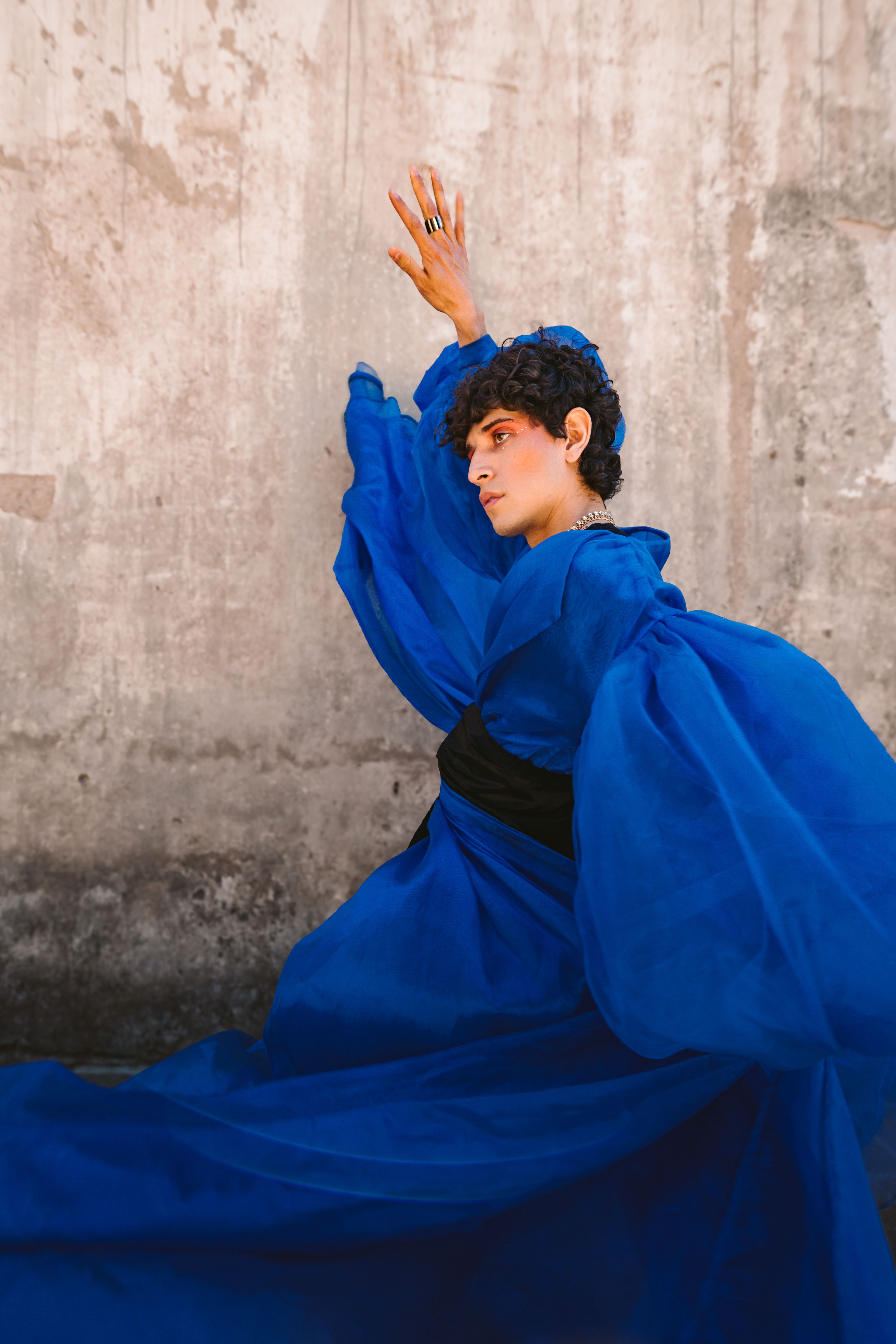 Artistic Portrait of Person in Flowing Blue Dress · Free Stock Photo